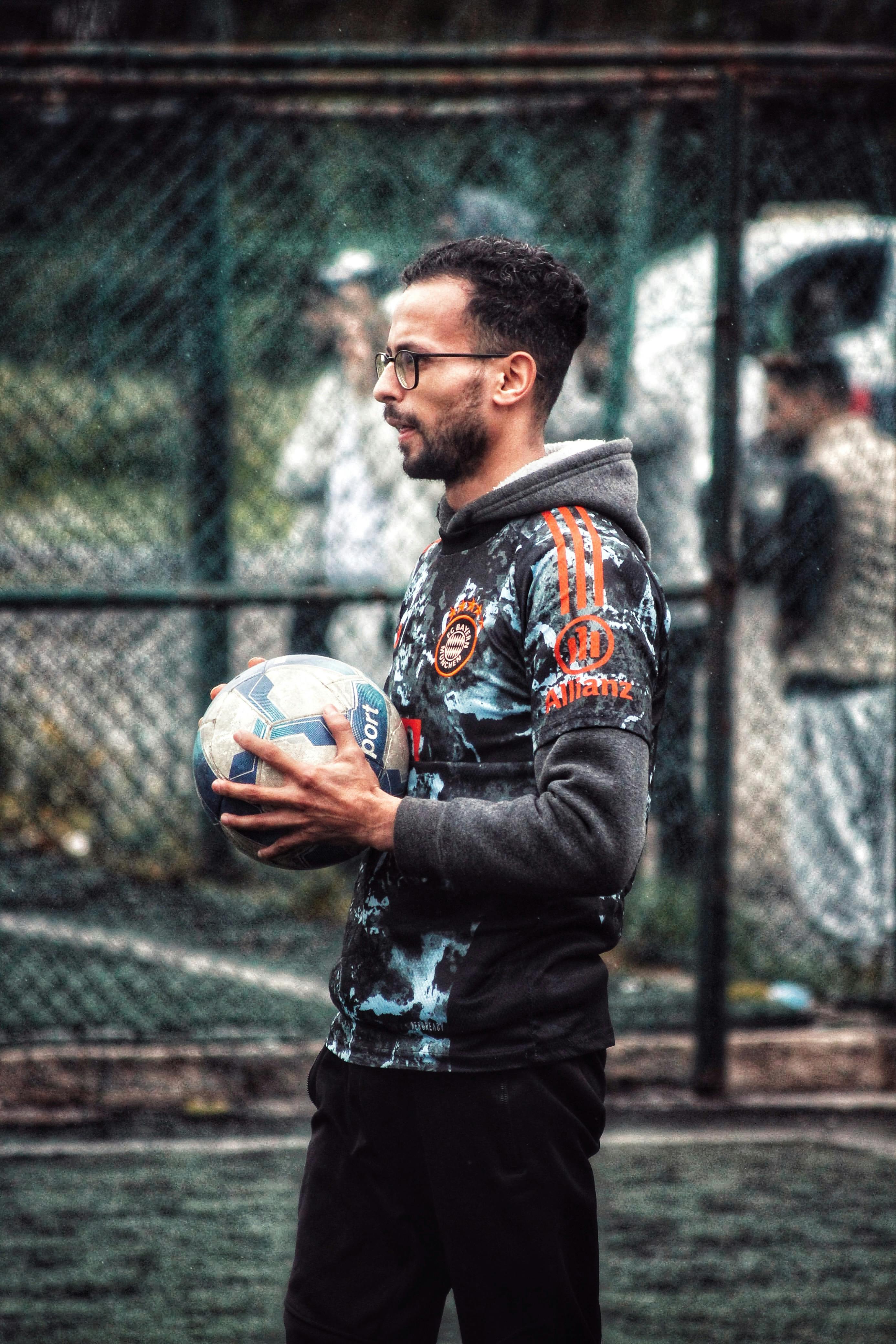 Soccer Coach Preparing for a Practice Session · Free Stock Photo