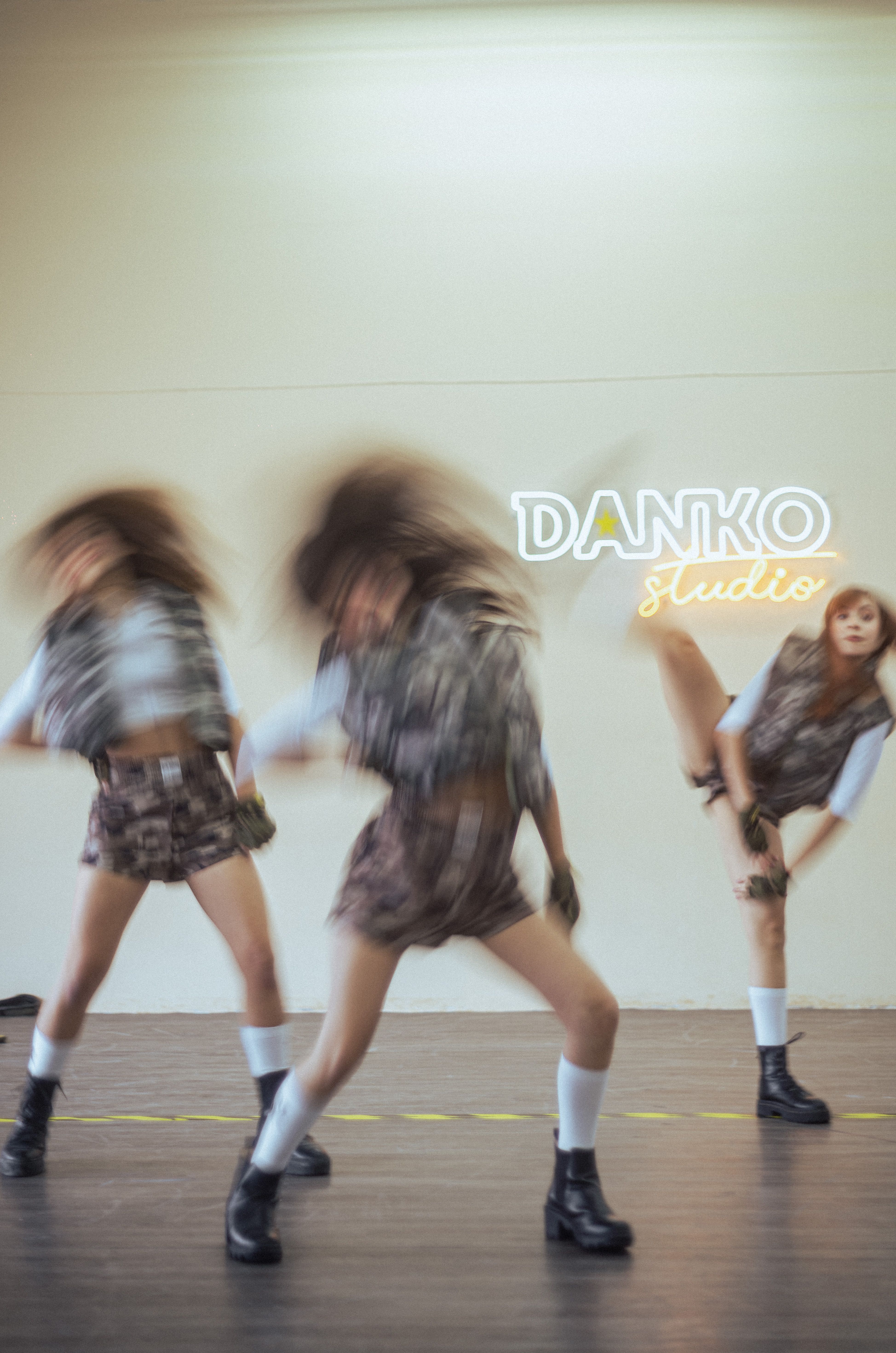 Dynamic Dance Movement in Studio Setting · Free Stock Photo
