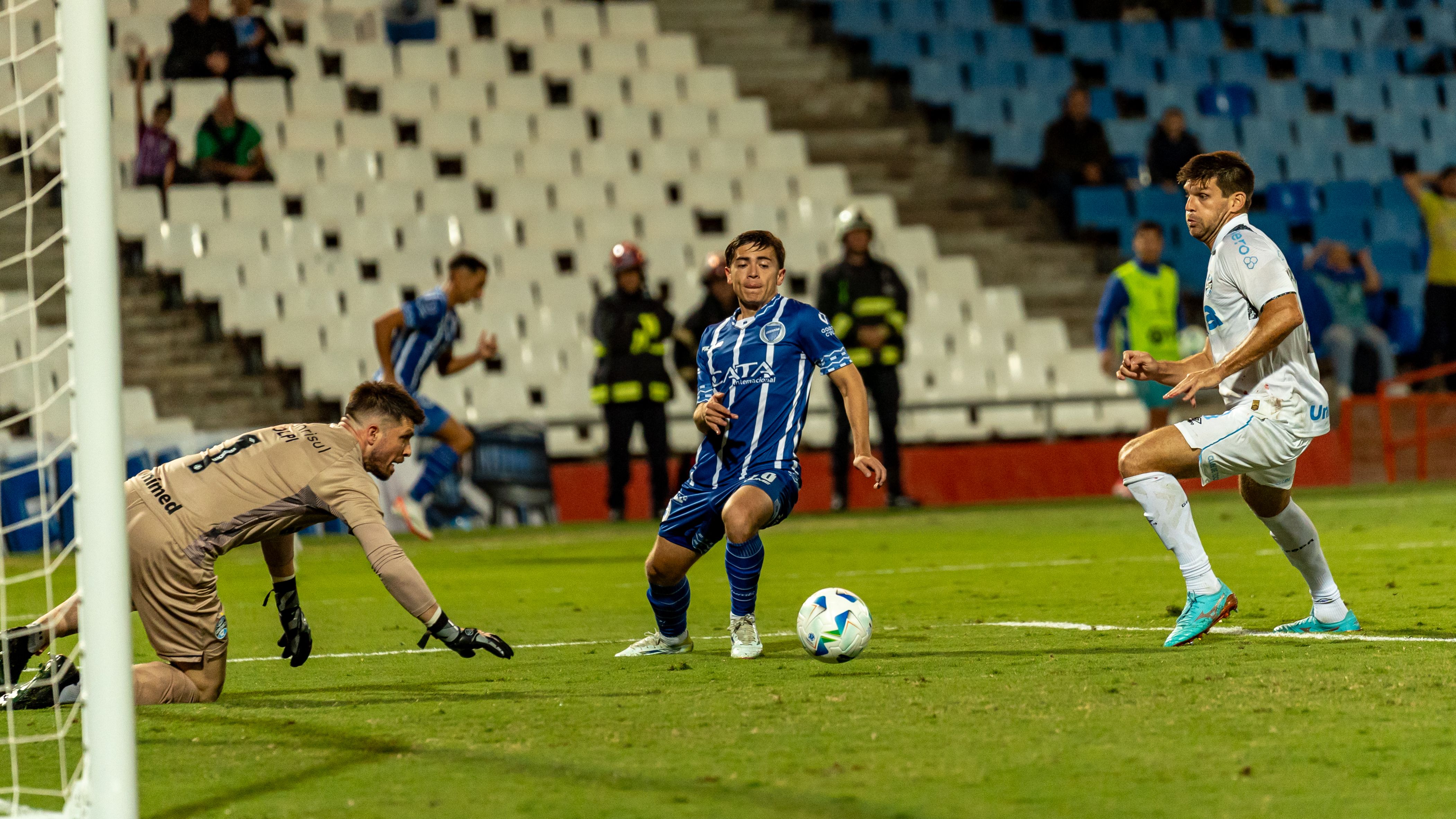 Intense Soccer Match Action with Goalkeeper and Players · Free Stock Photo