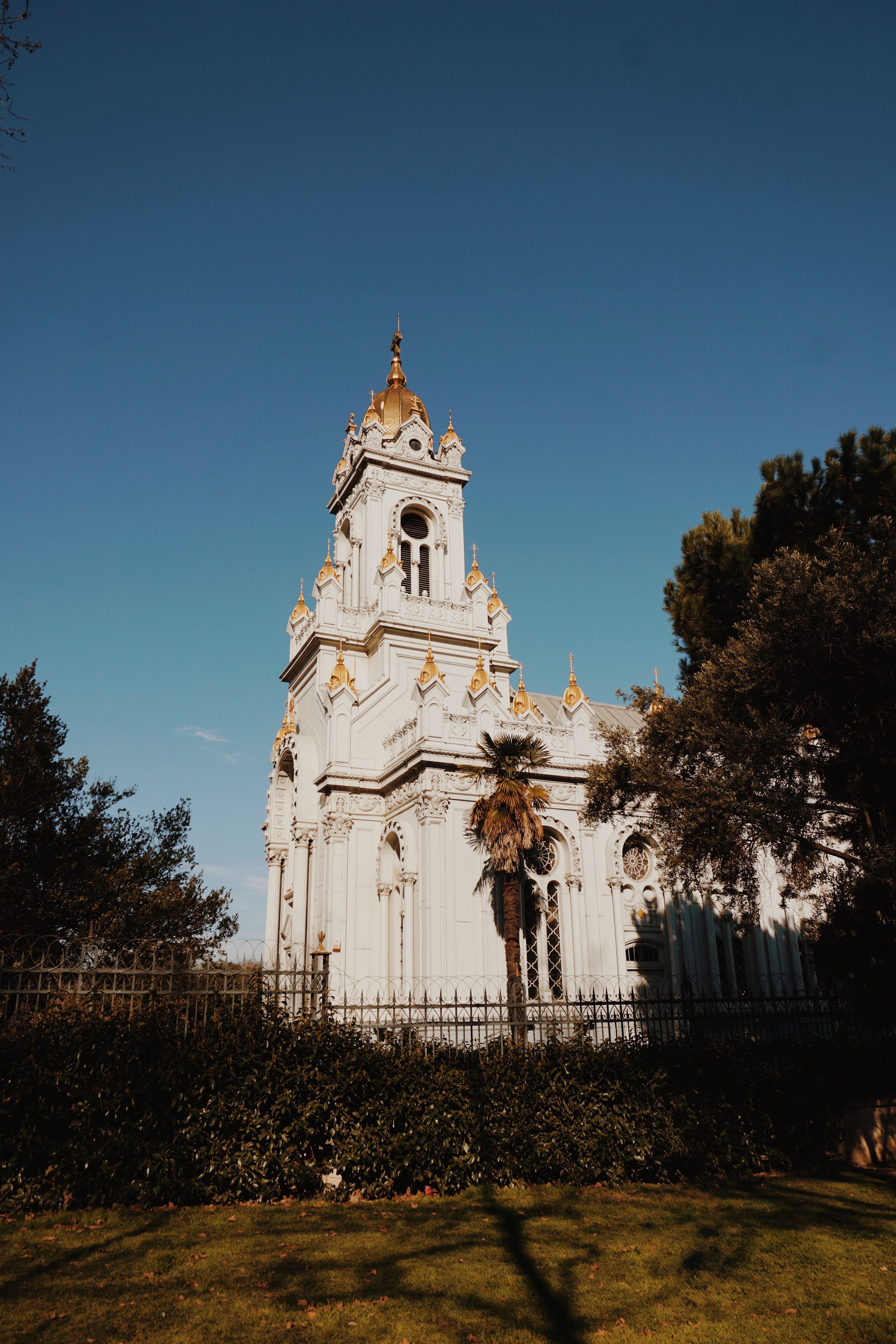 Majestic White Church with Golden Accents · Free Stock Photo