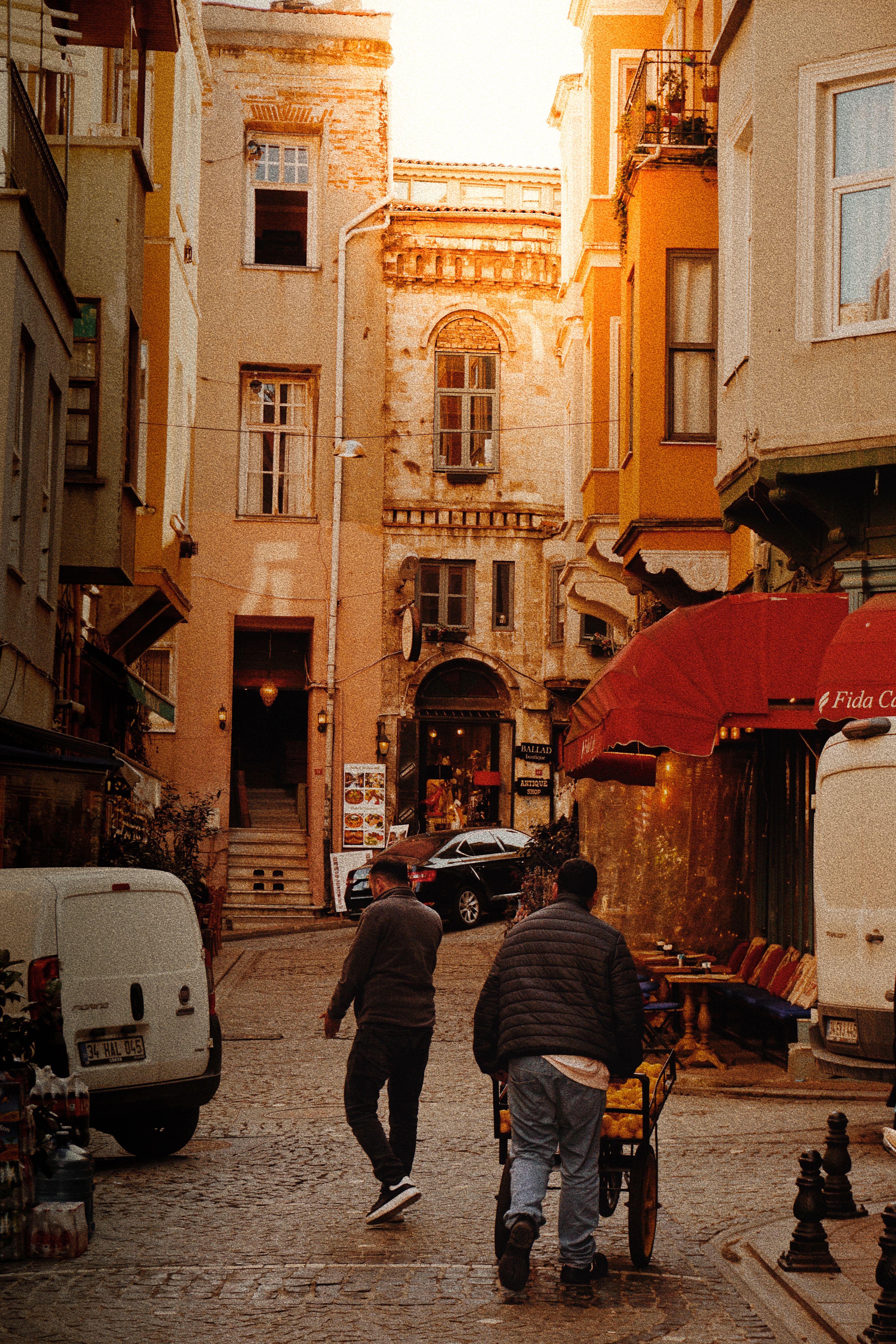 Charming Sunset Stroll in Historic Urban Alleyway · Free Stock Photo