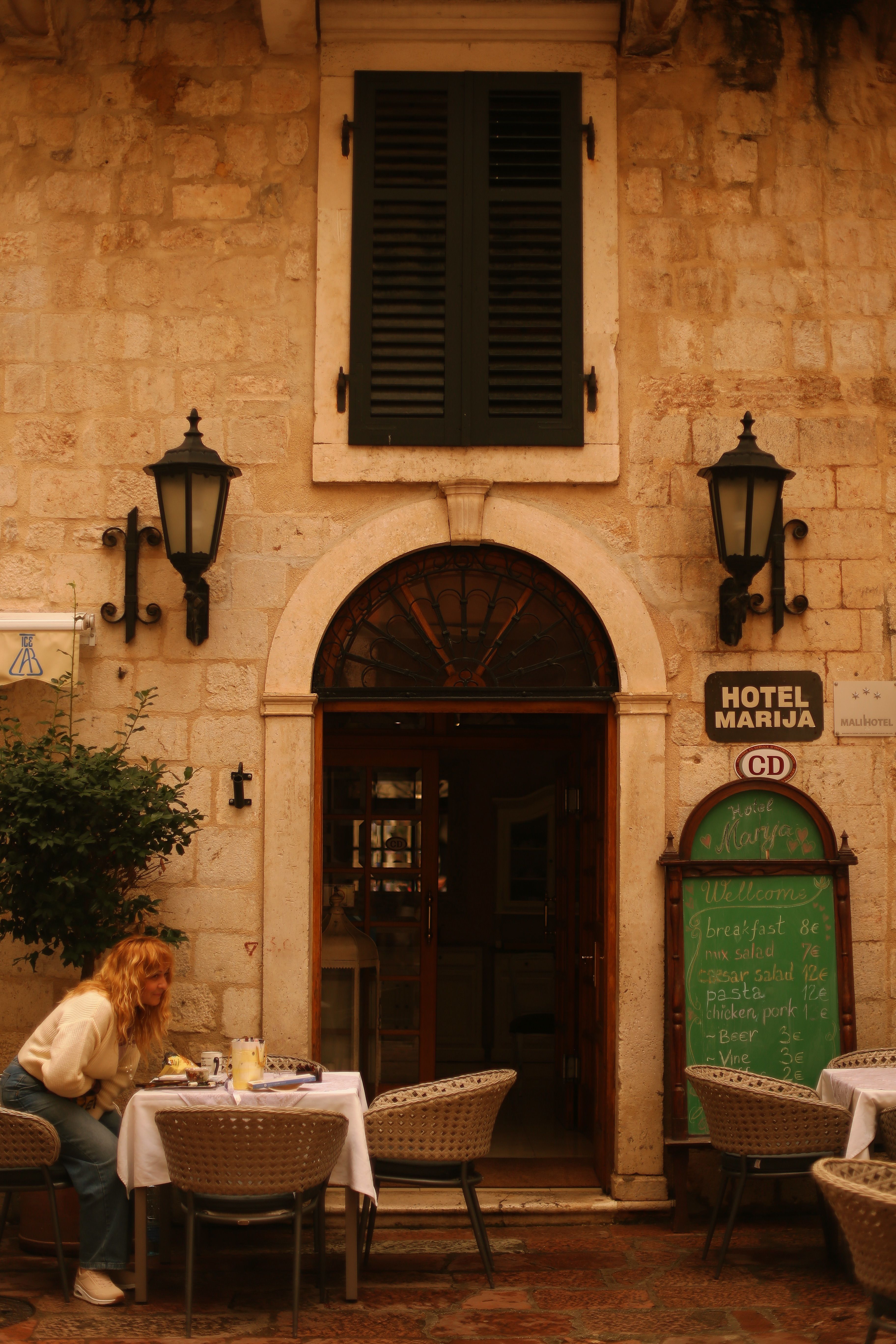 Charming European Cafe with Historic Facade · Free Stock Photo