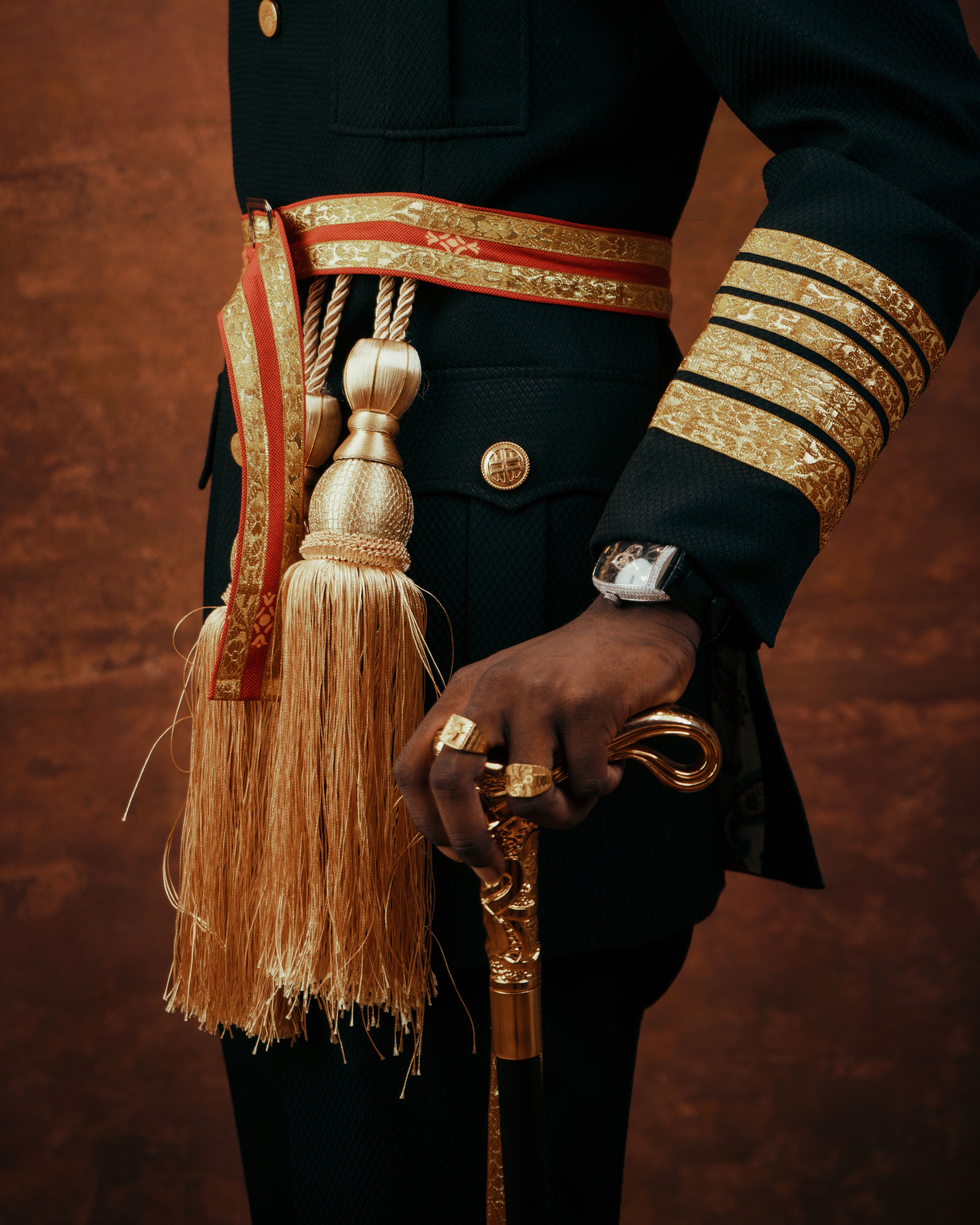 Elegant Military Uniform with Golden Accents · Free Stock Photo