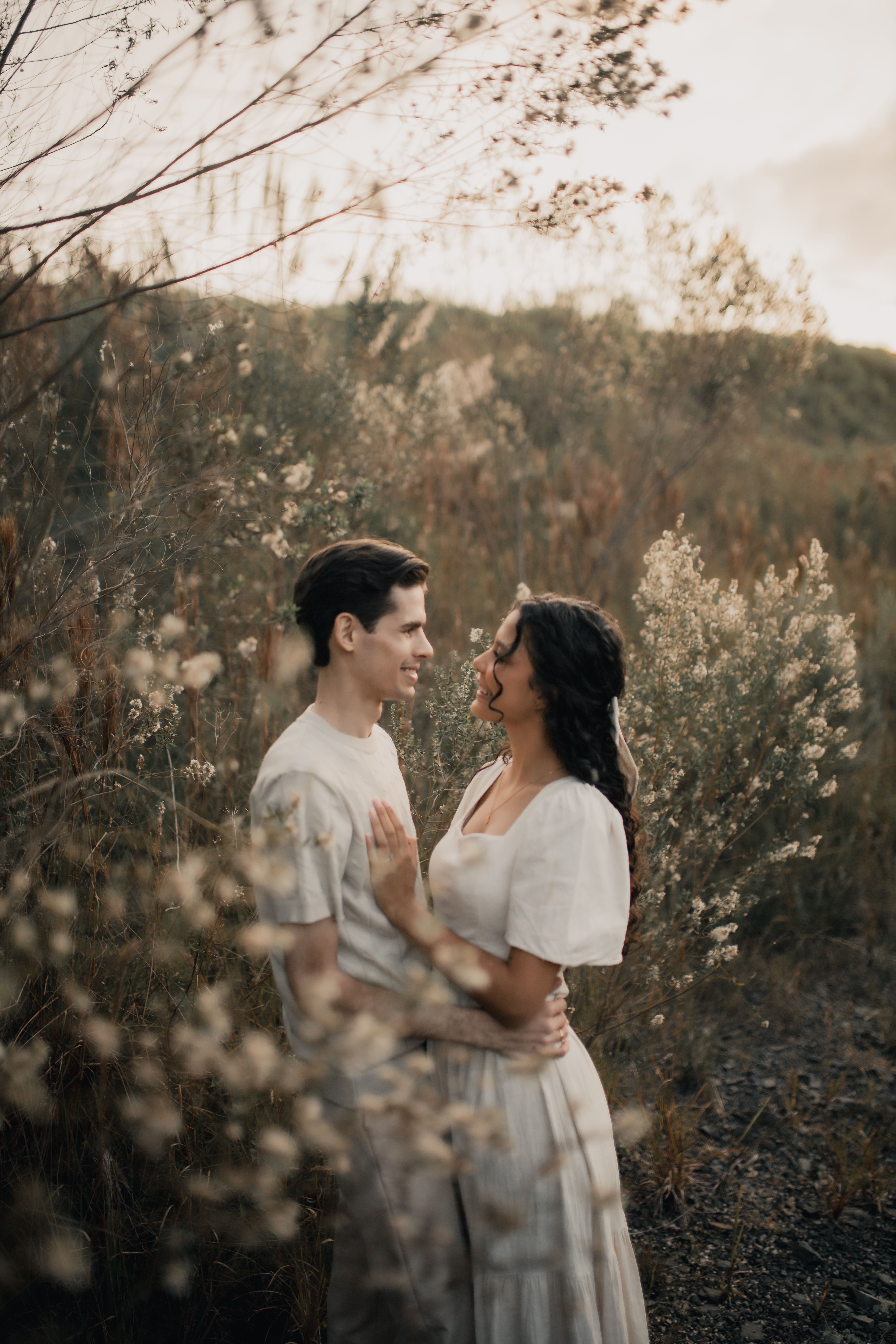 Romantic Couple in Natural Meadow Setting · Free Stock Photo
