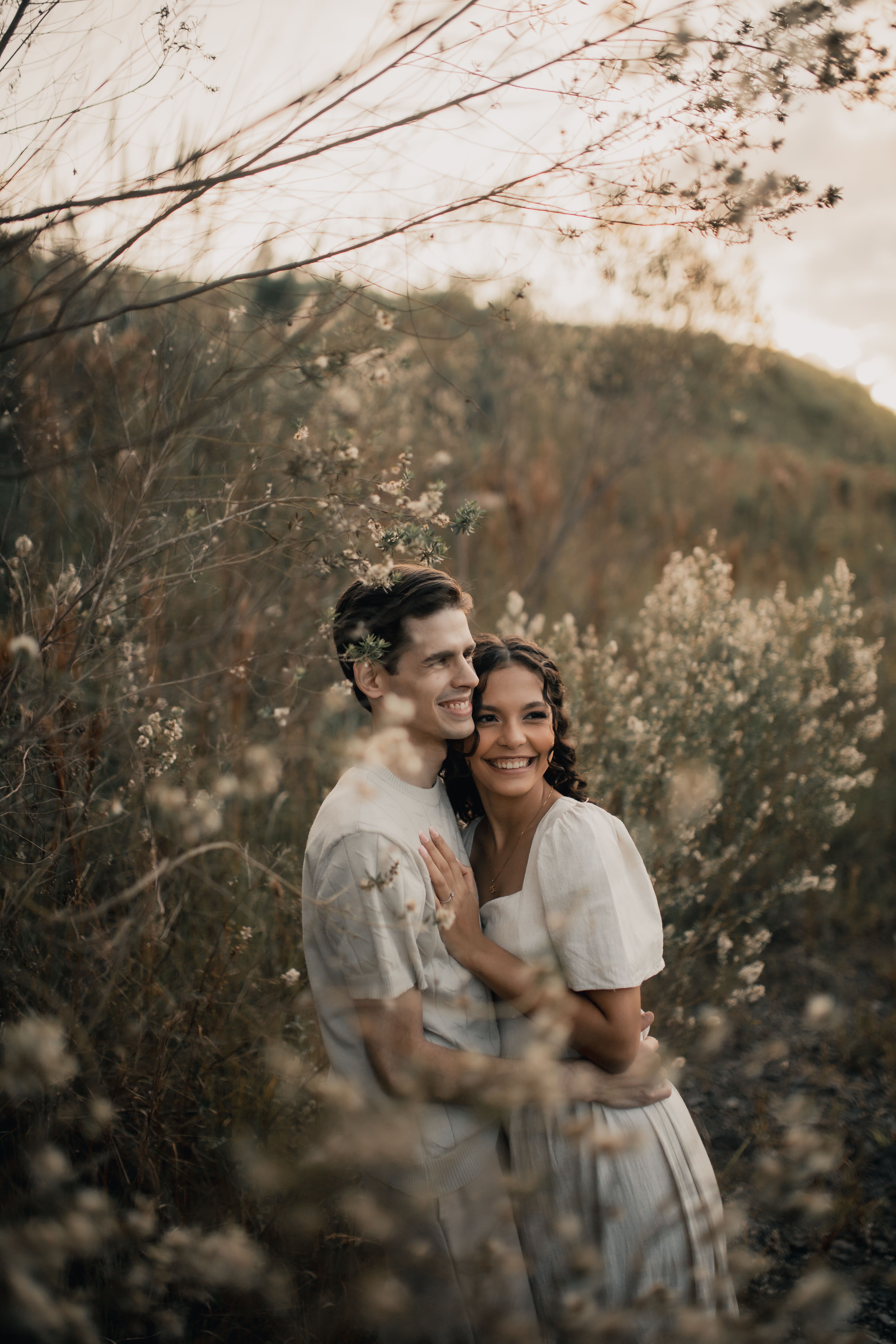 Romantic Couple Embracing in Nature Setting · Free Stock Photo