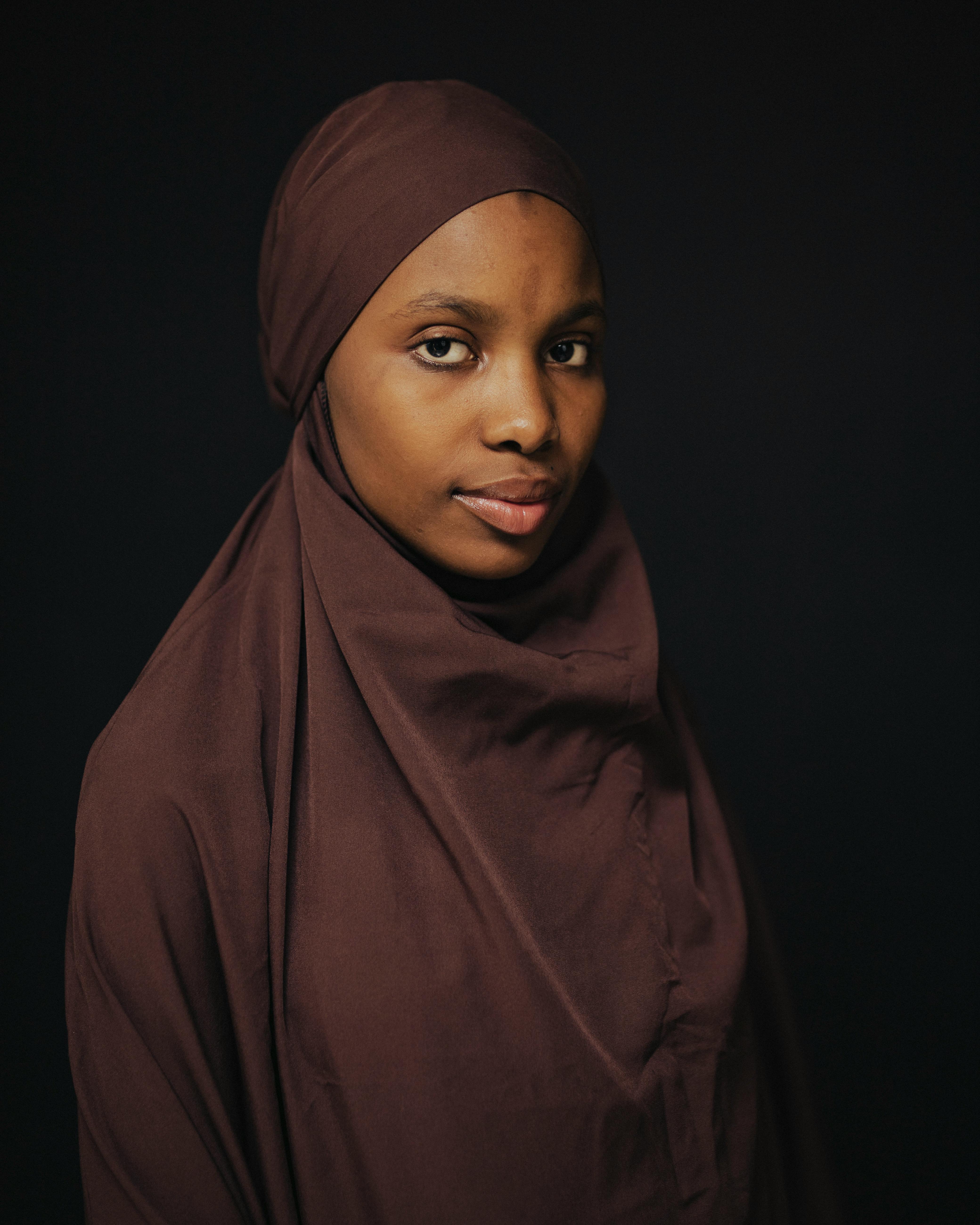 Portrait of a Woman in a Hijab with Intense Gaze · Free Stock Photo