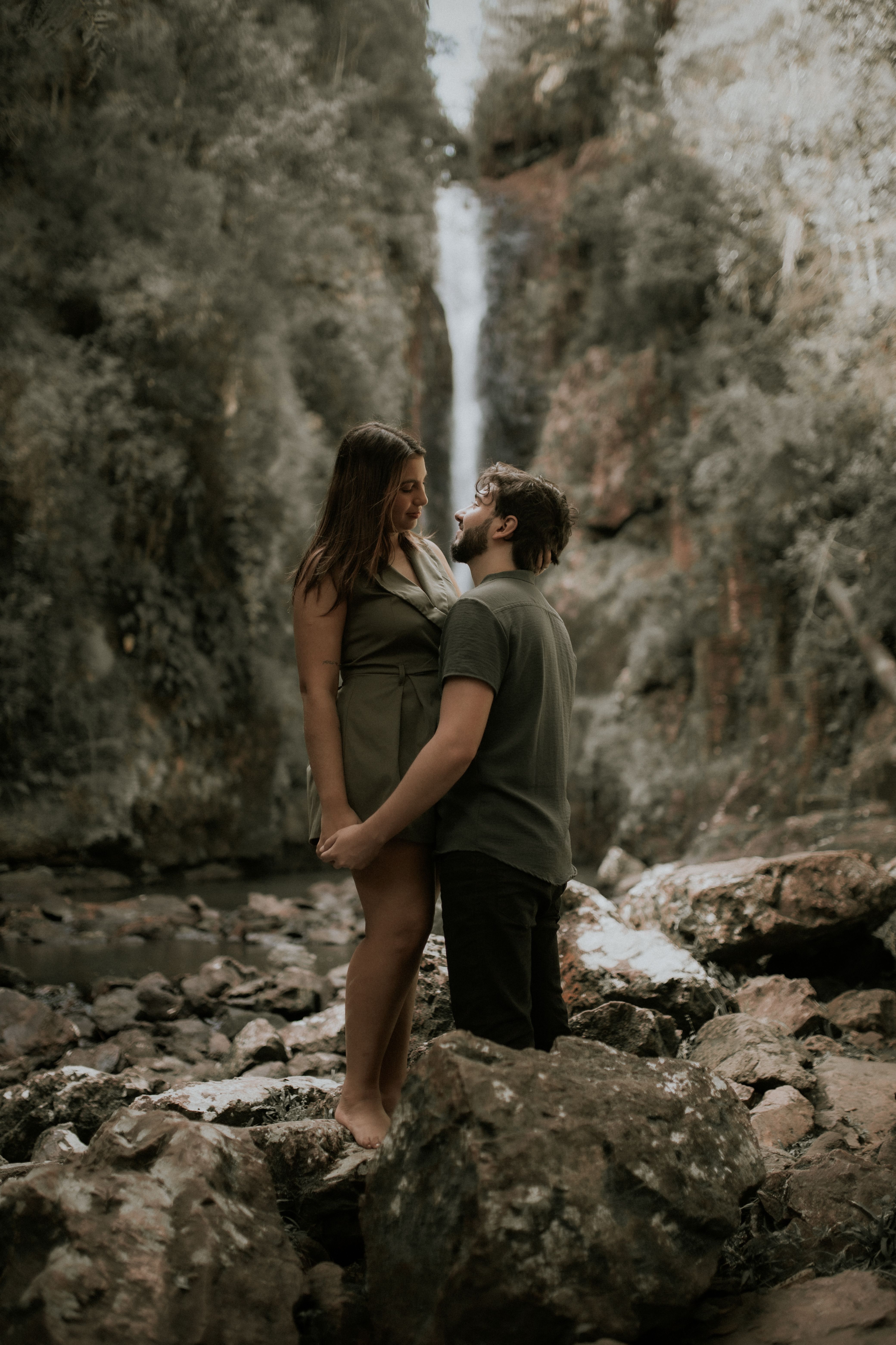 Romantic Couple Embracing by Waterfall · Free Stock Photo