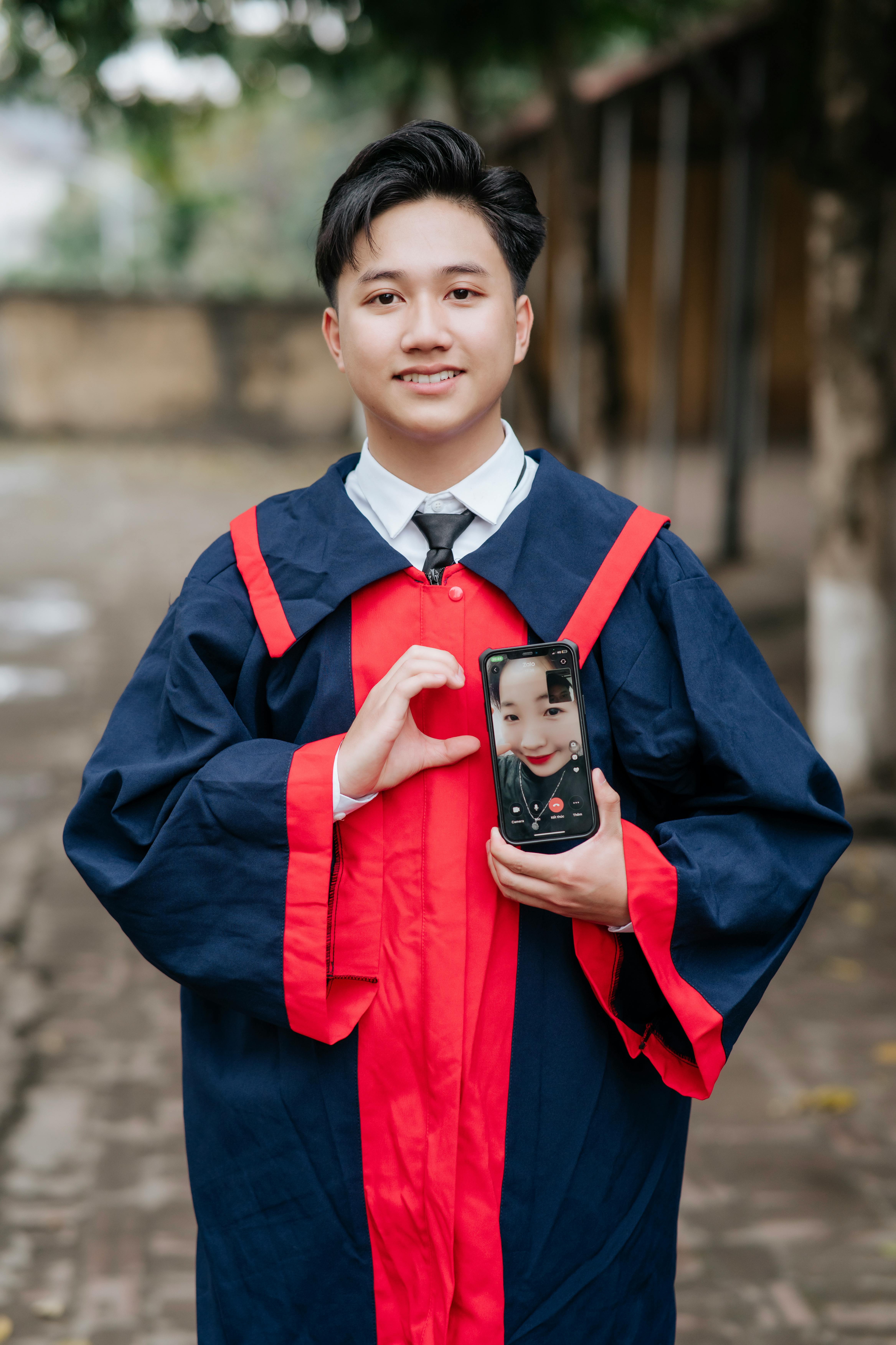 Graduation Celebration with Mobile Video Call · Free Stock Photo