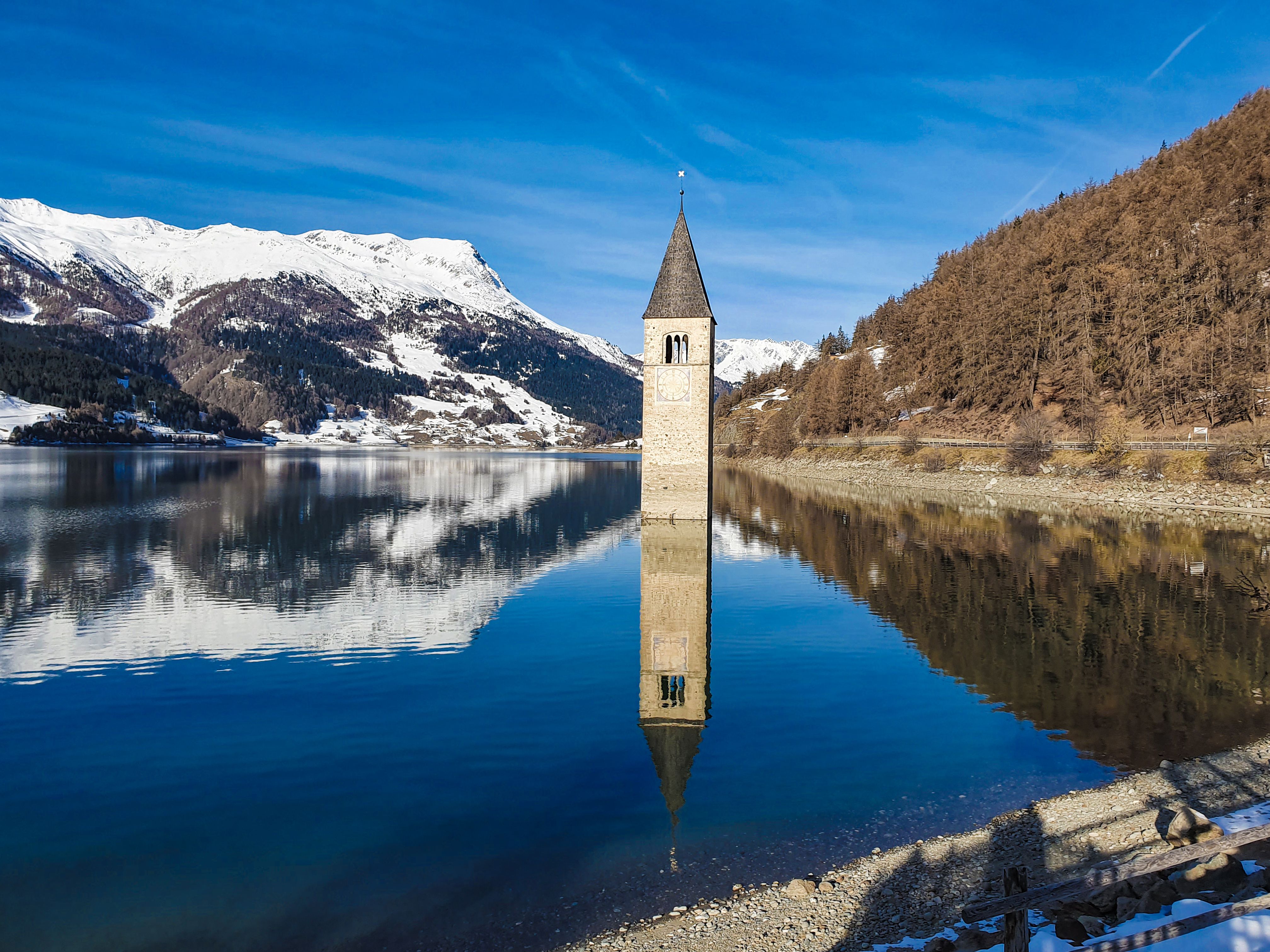Lake Resia with Submerged Bell Tower in Winter · Free Stock Photo