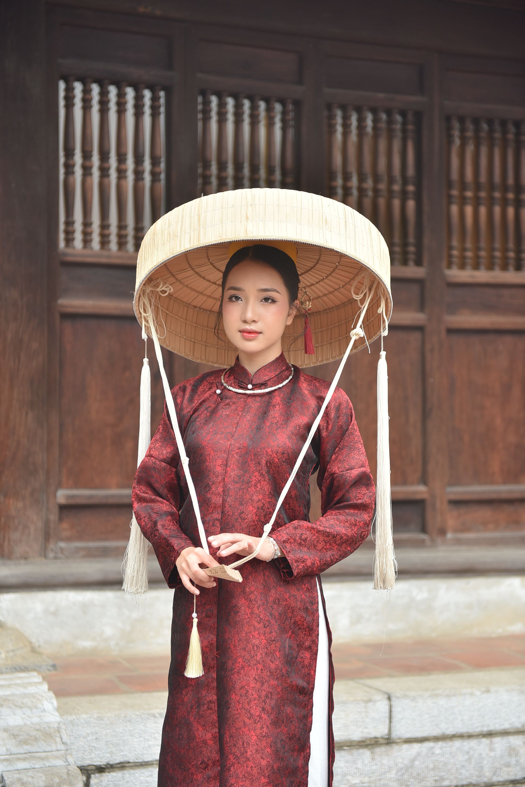 Traditional Asian Attire with Large Hat · Free Stock Photo