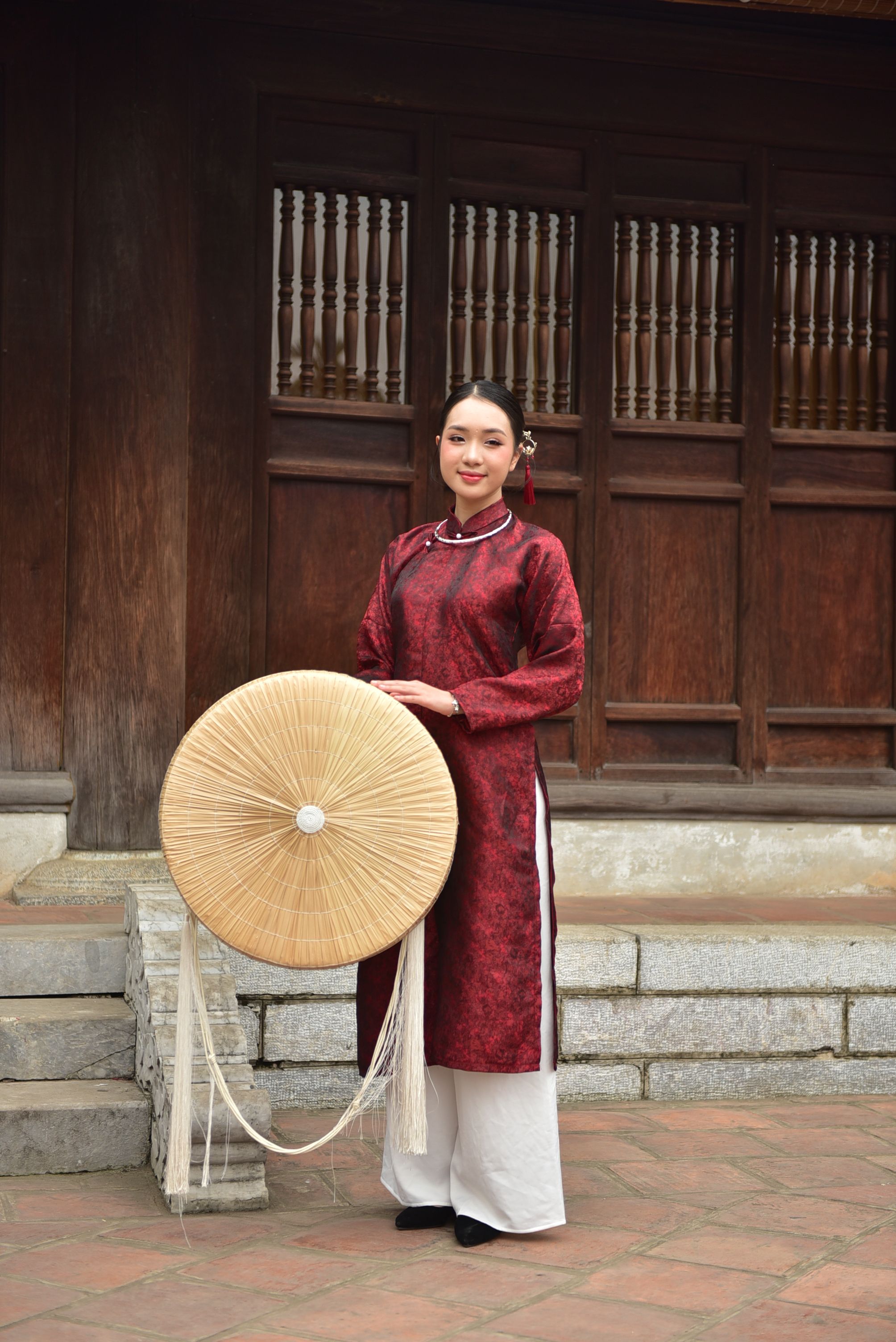 Traditional Vietnamese Attire with Conical Hat · Free Stock Photo