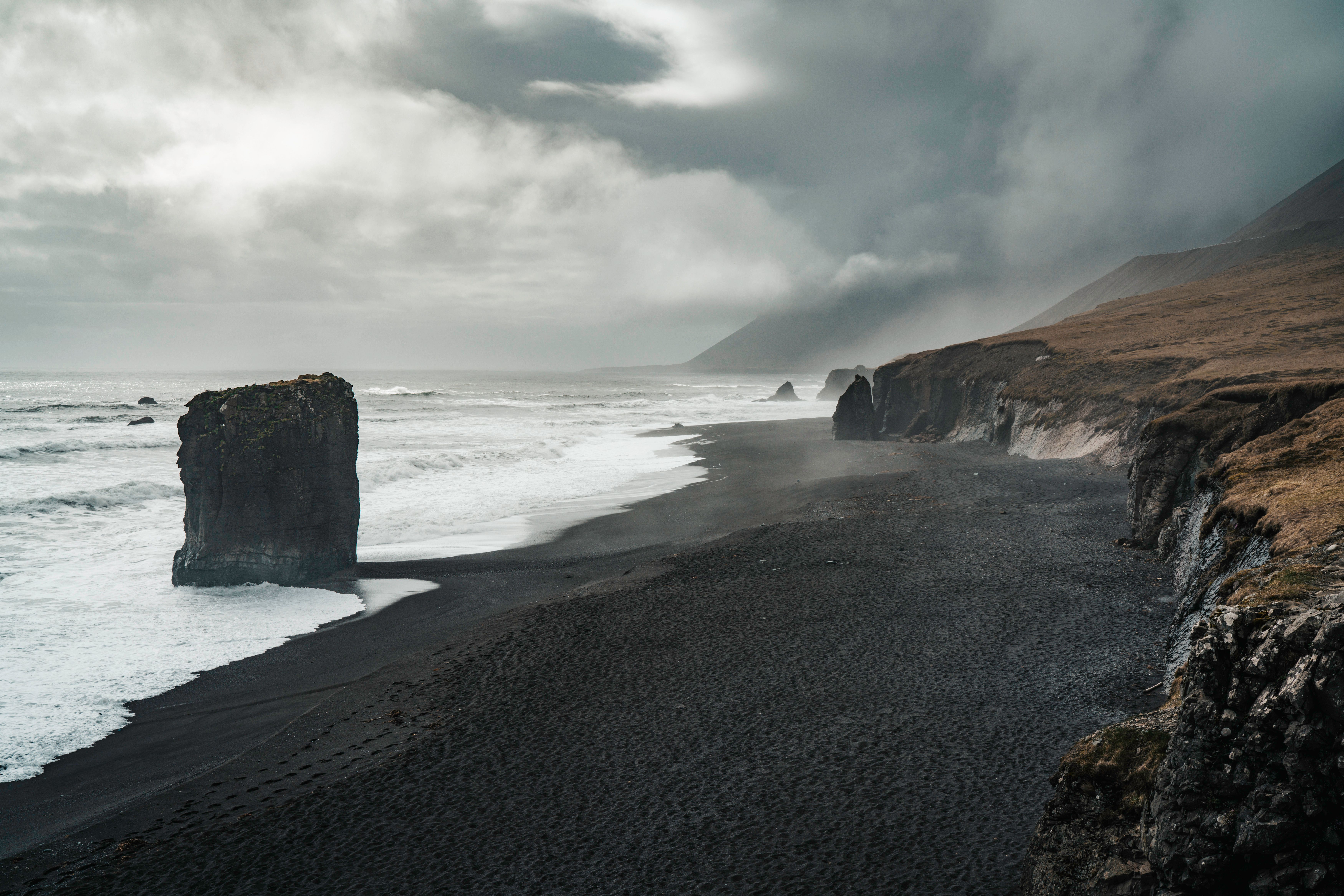 Dramatic Icelandic Coastline with Black Sand Beach · Free Stock Photo