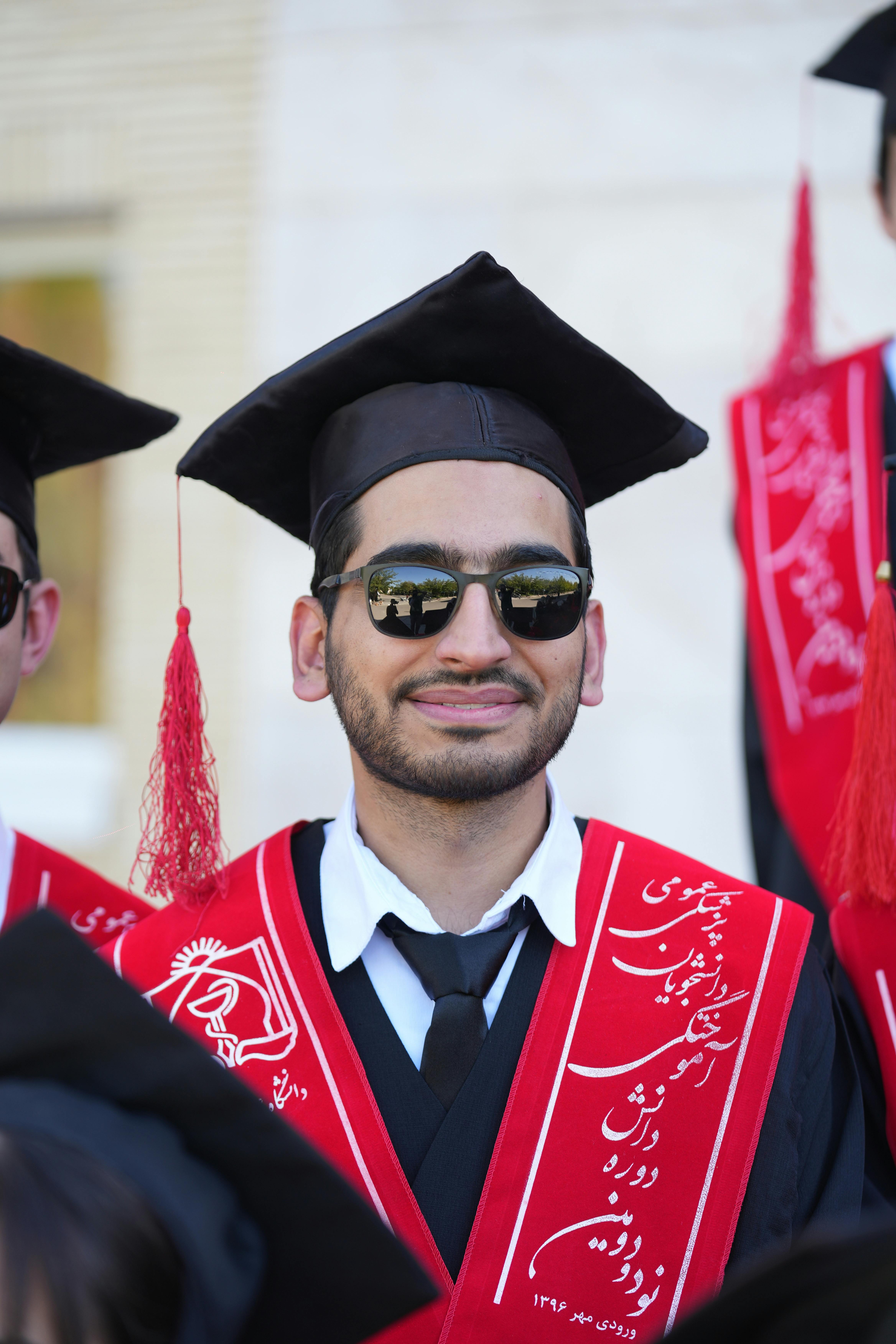 Graduation Ceremony in Iran with Traditional Attire · Free Stock Photo