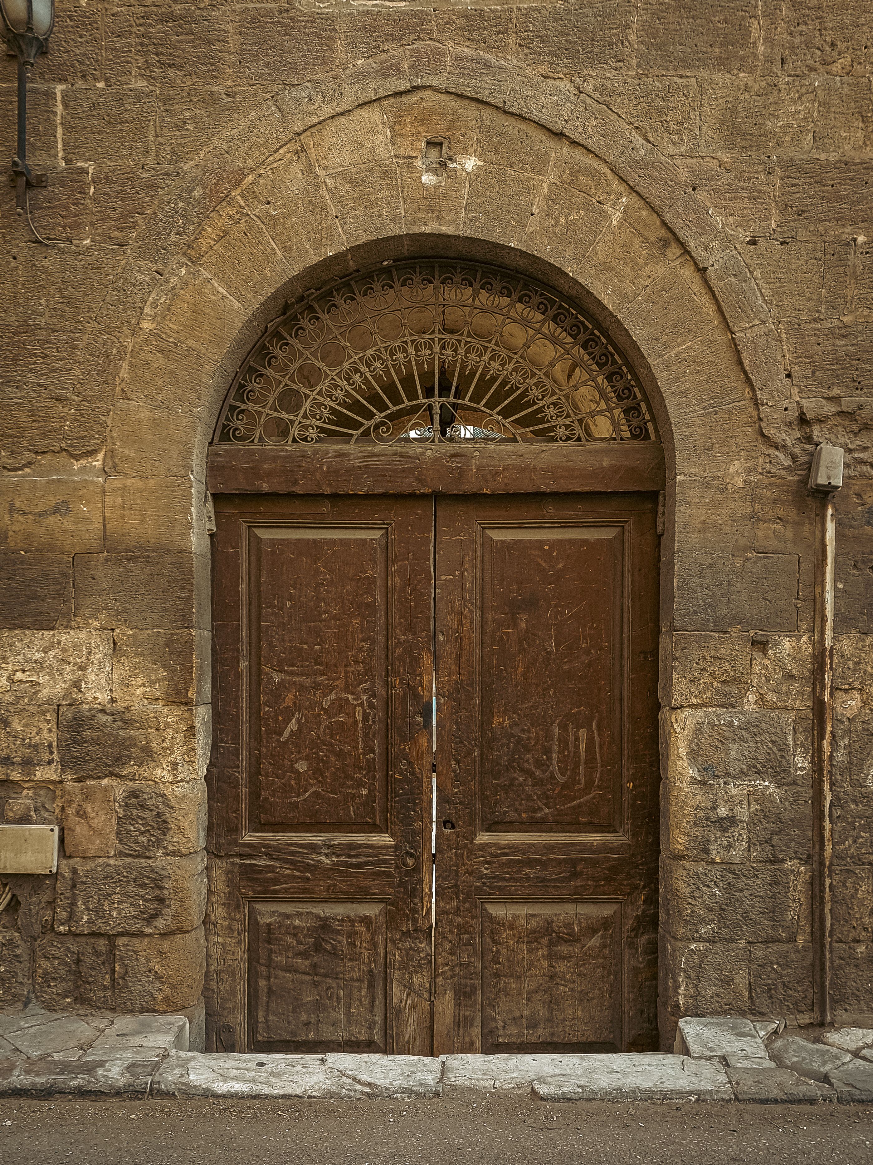Historical Archway and Wooden Door Architecture · Free Stock Photo