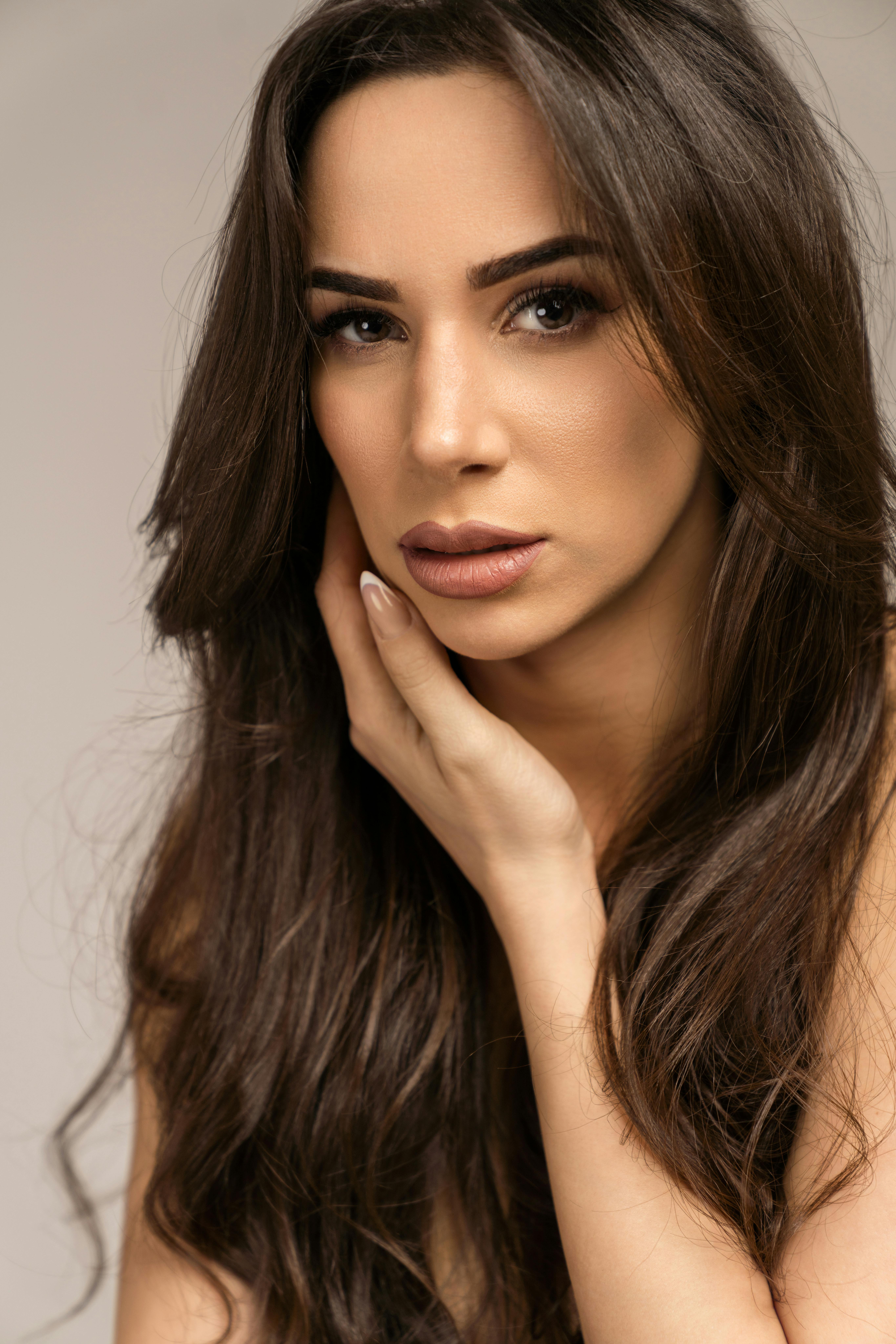 Elegant Portrait of Woman with Long Hair · Free Stock Photo