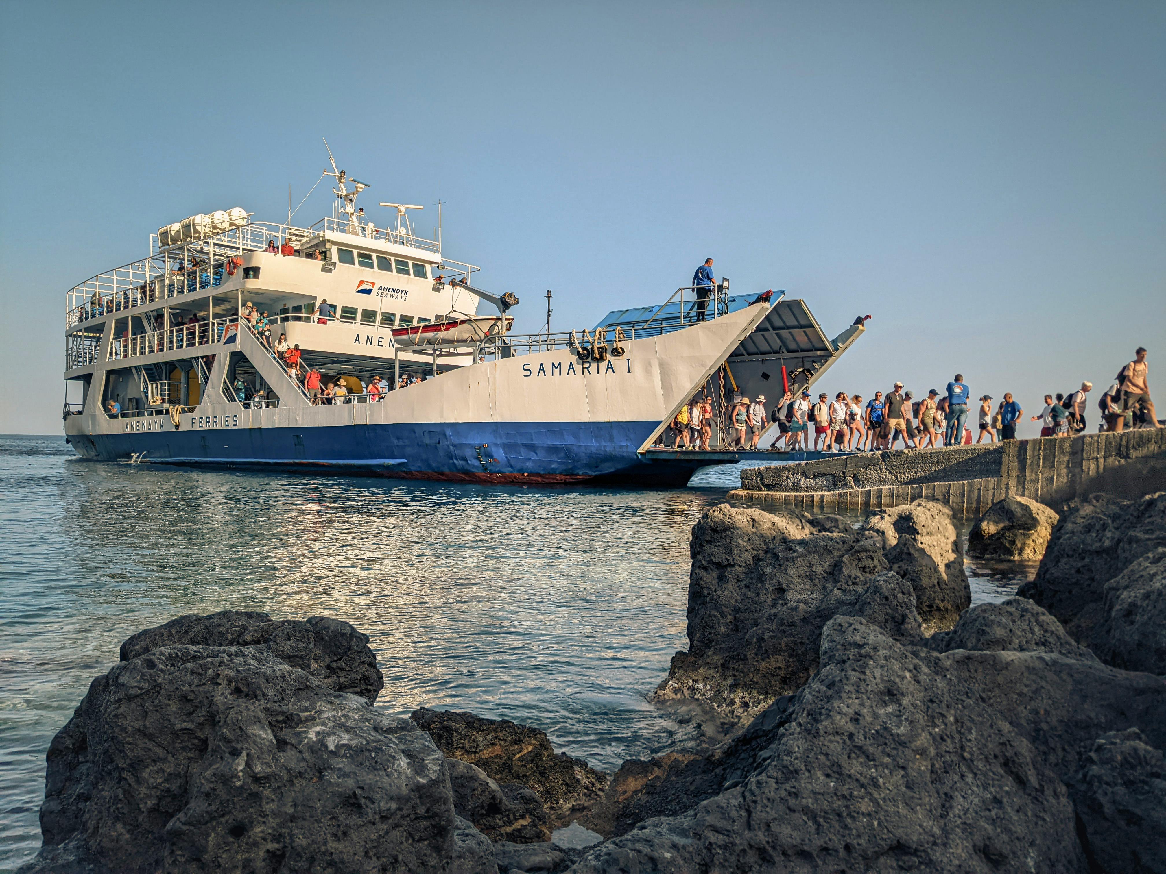 Tourists Disembarking Ferry at Crete Island · Free Stock Photo