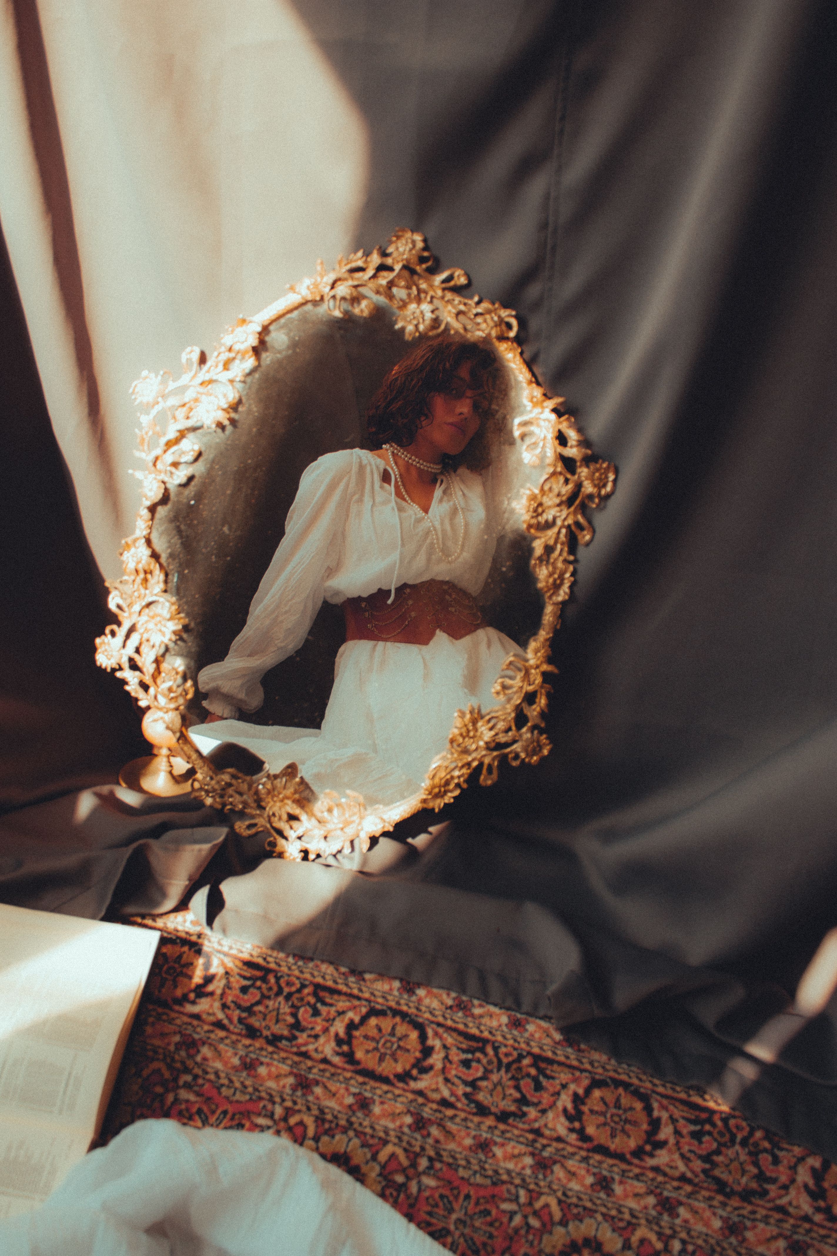 Artistic Reflection in Ornate Vintage Mirror · Free Stock Photo