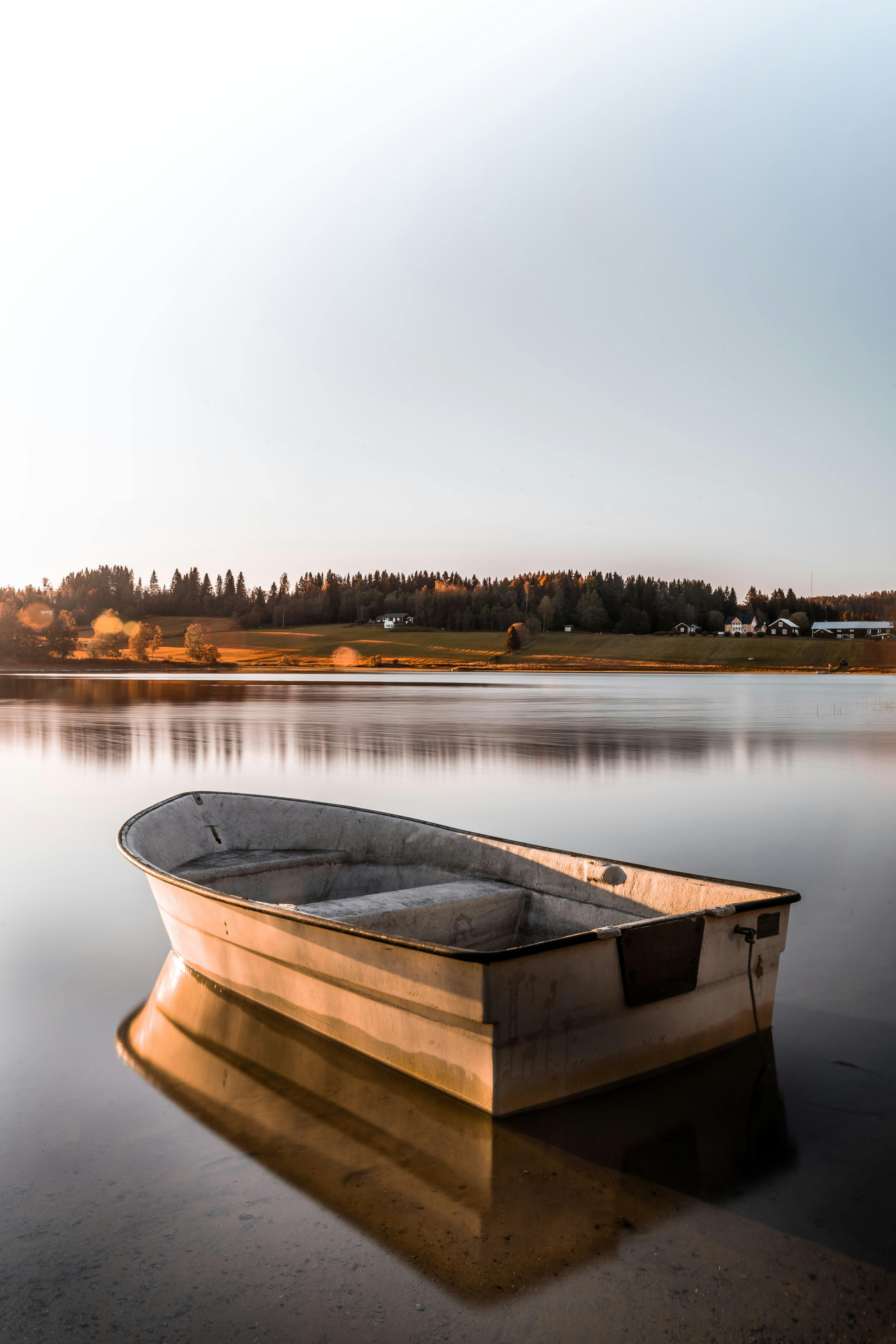White Boat on Body of Water · Free Stock Photo