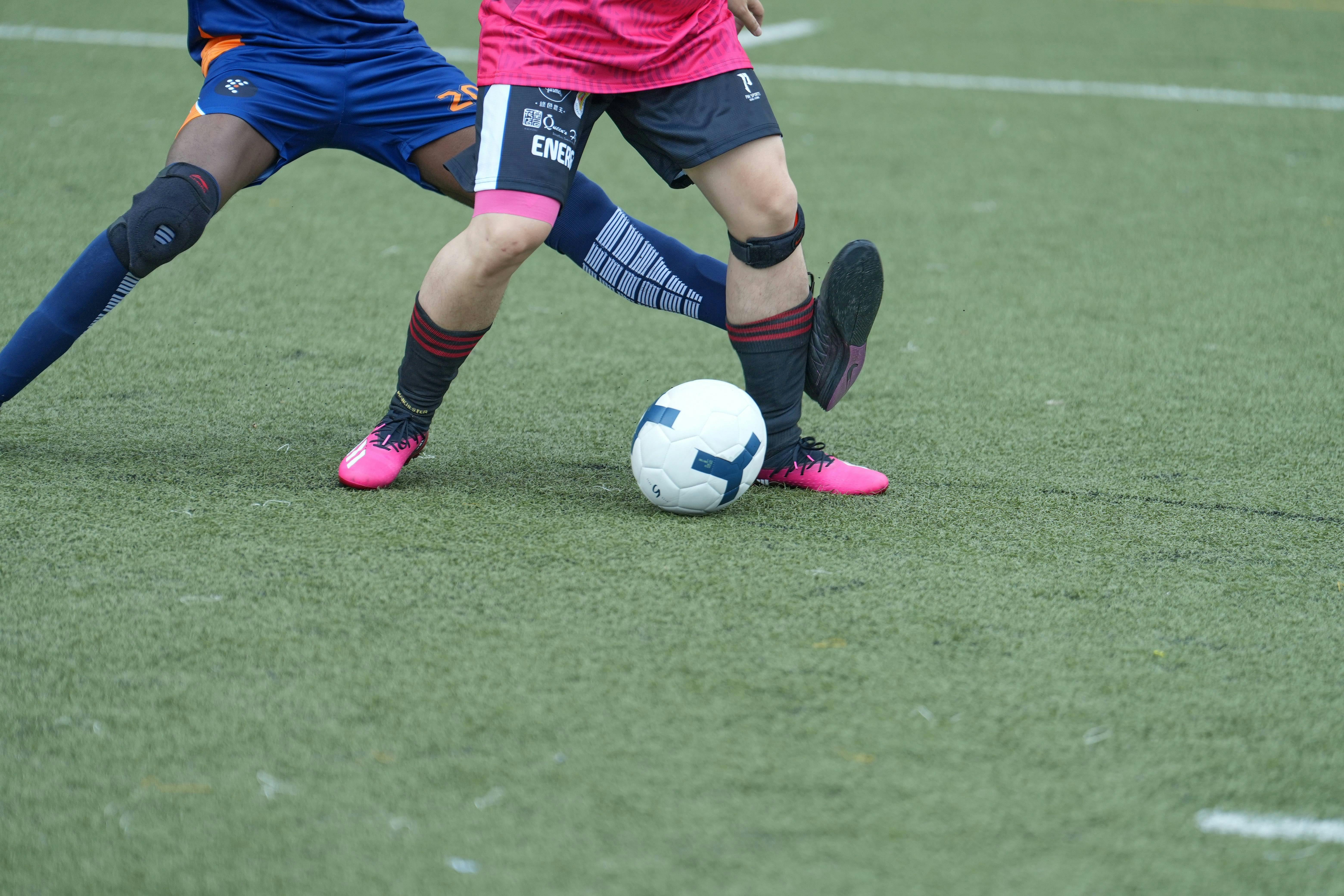 Dynamic Soccer Game Action on Grass Field · Free Stock Photo