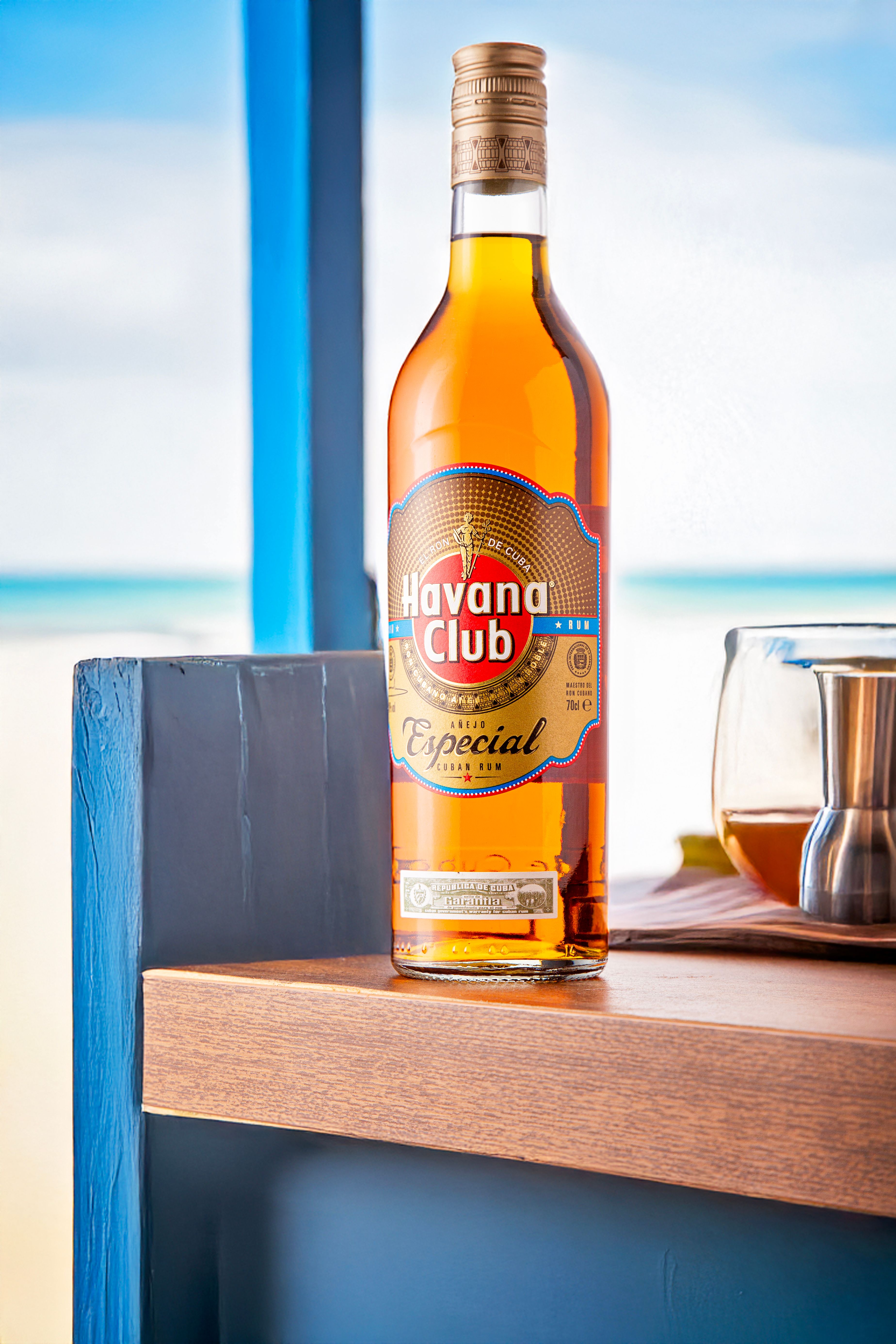 Havana Club Rum on Beachside Table · Free Stock Photo