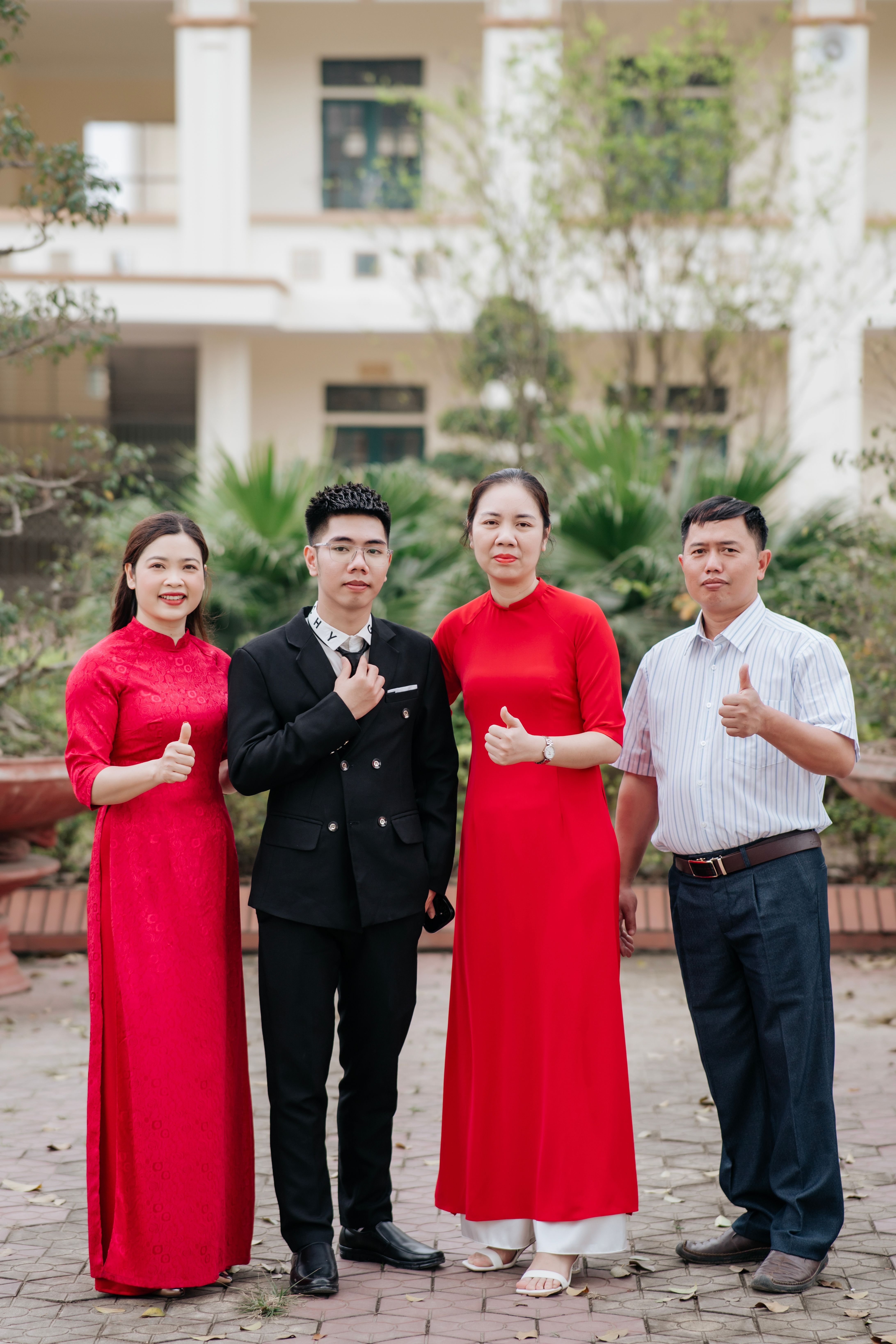 Group Portrait of Adults in Formal Attire Outdoors · Free Stock Photo