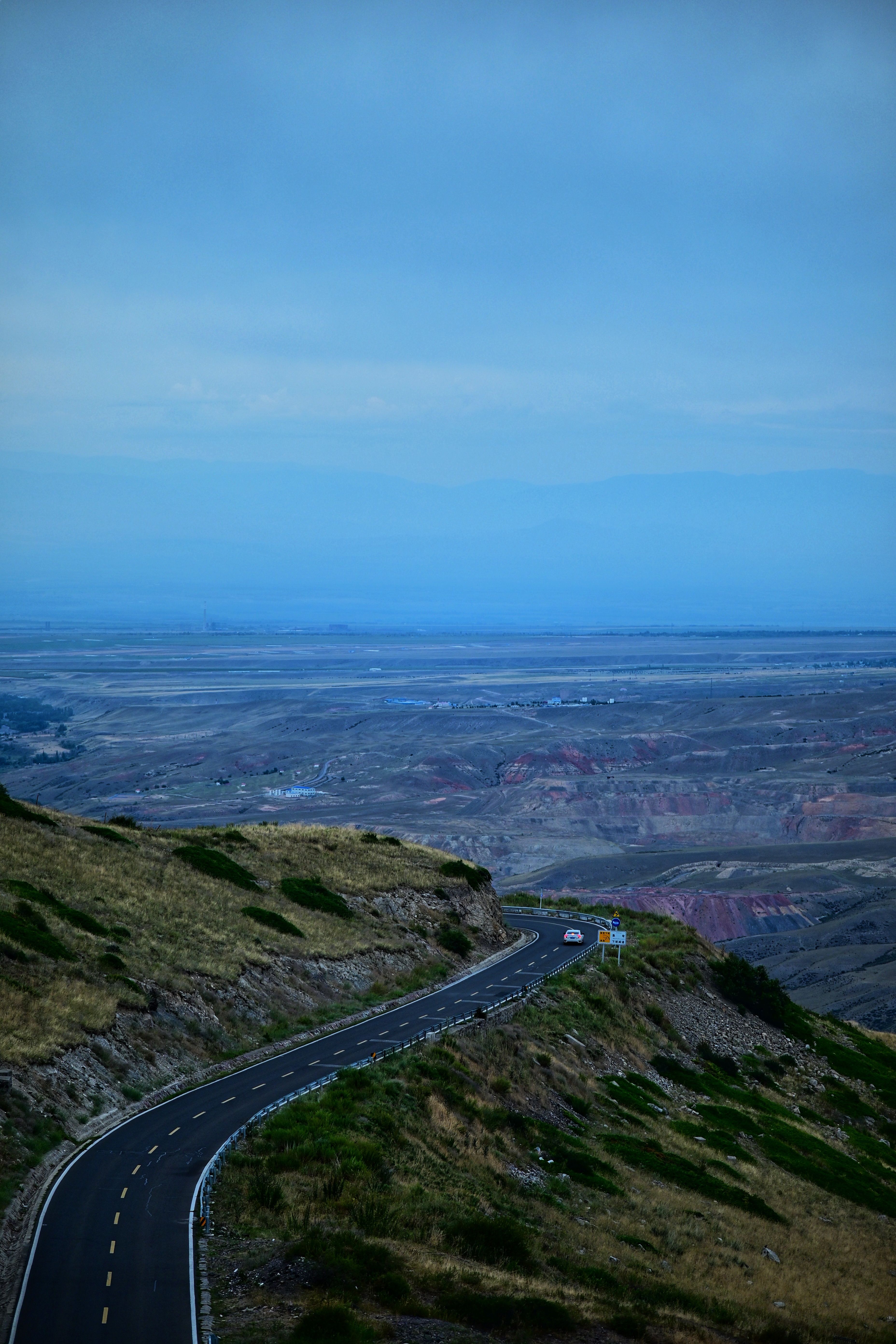 Scenic Winding Road in Mountainous Landscape · Free Stock Photo