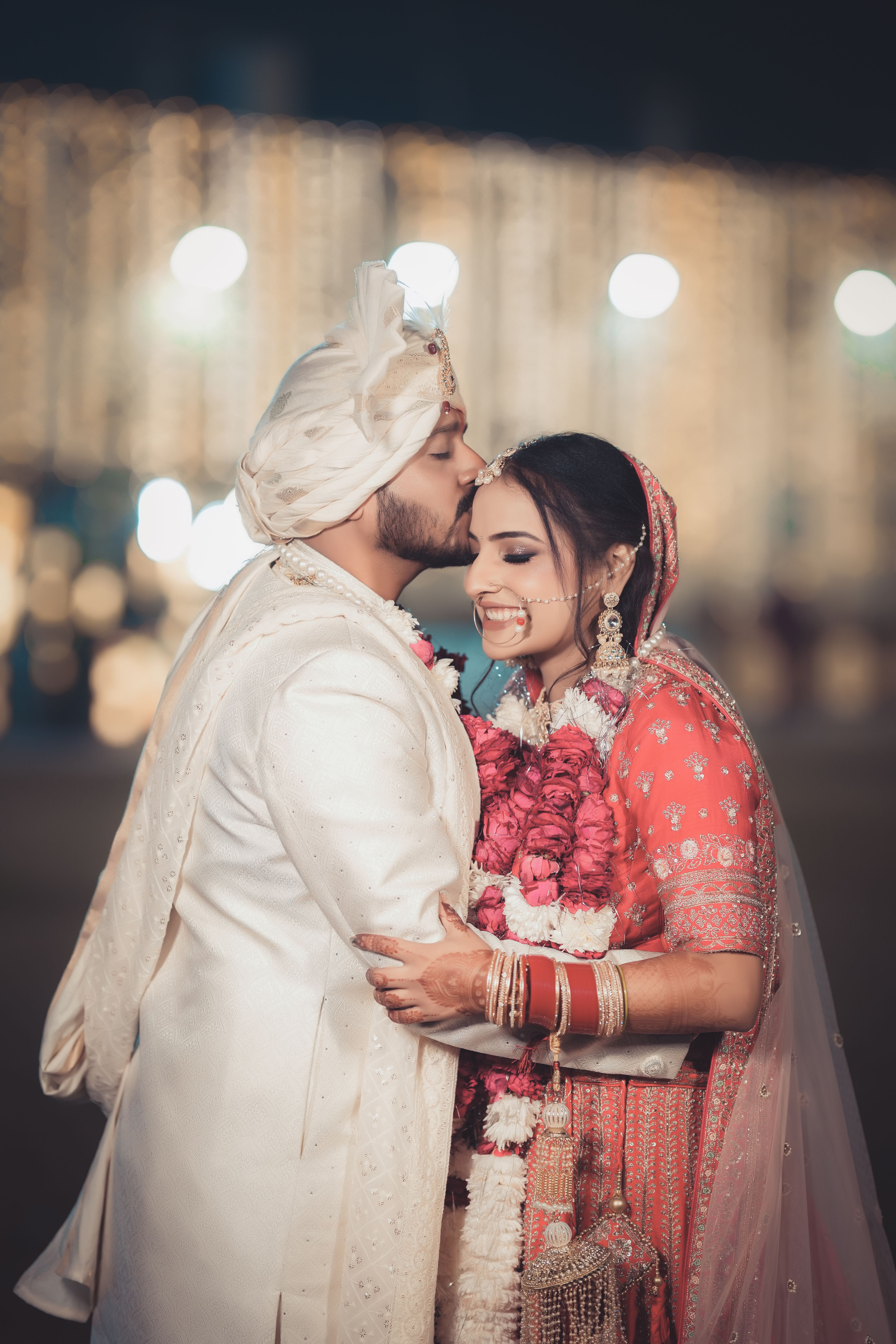 Romantic Indian Wedding Embrace at Night · Free Stock Photo