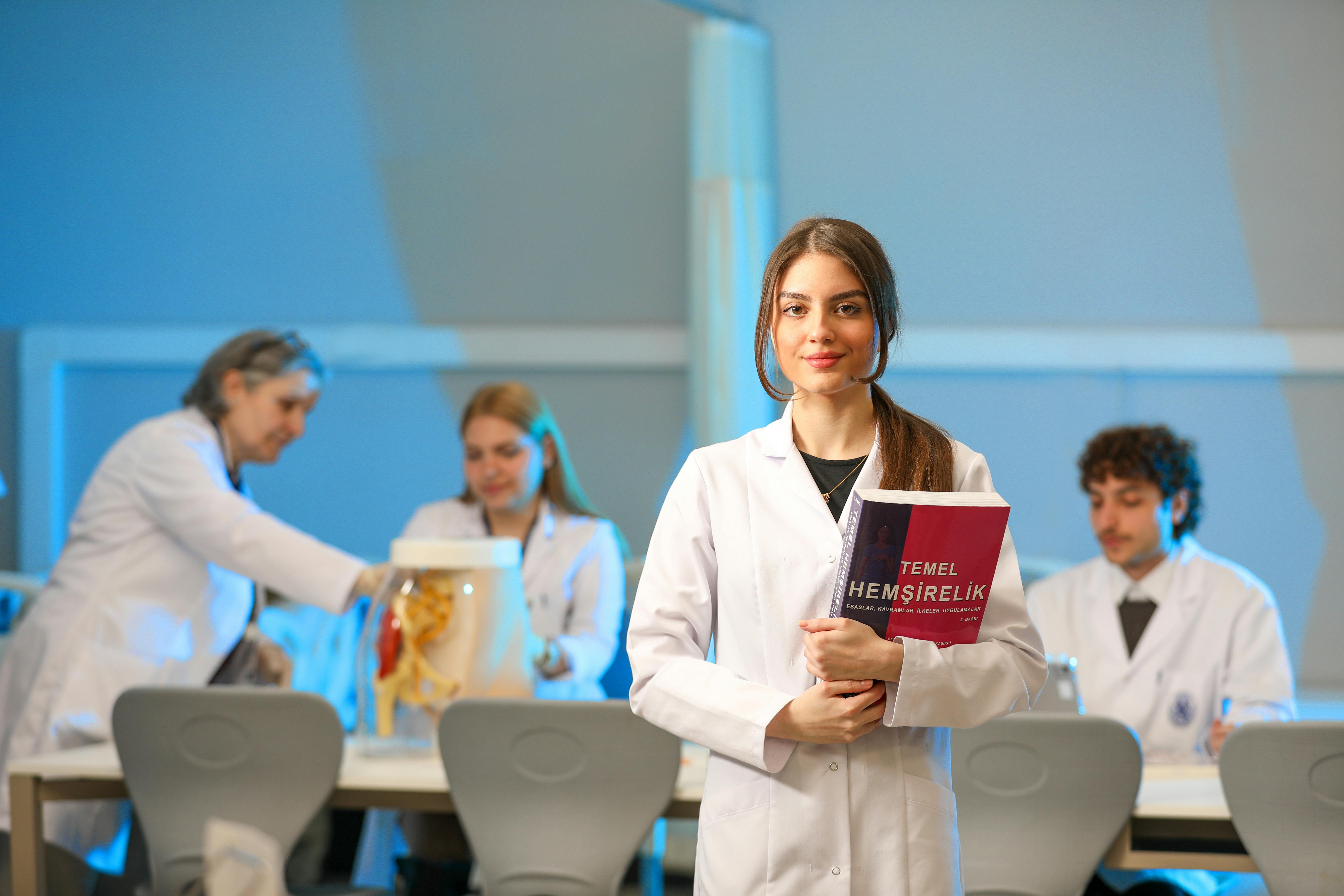 Aspiring Nurse Students in Laboratory Setting · Free Stock Photo