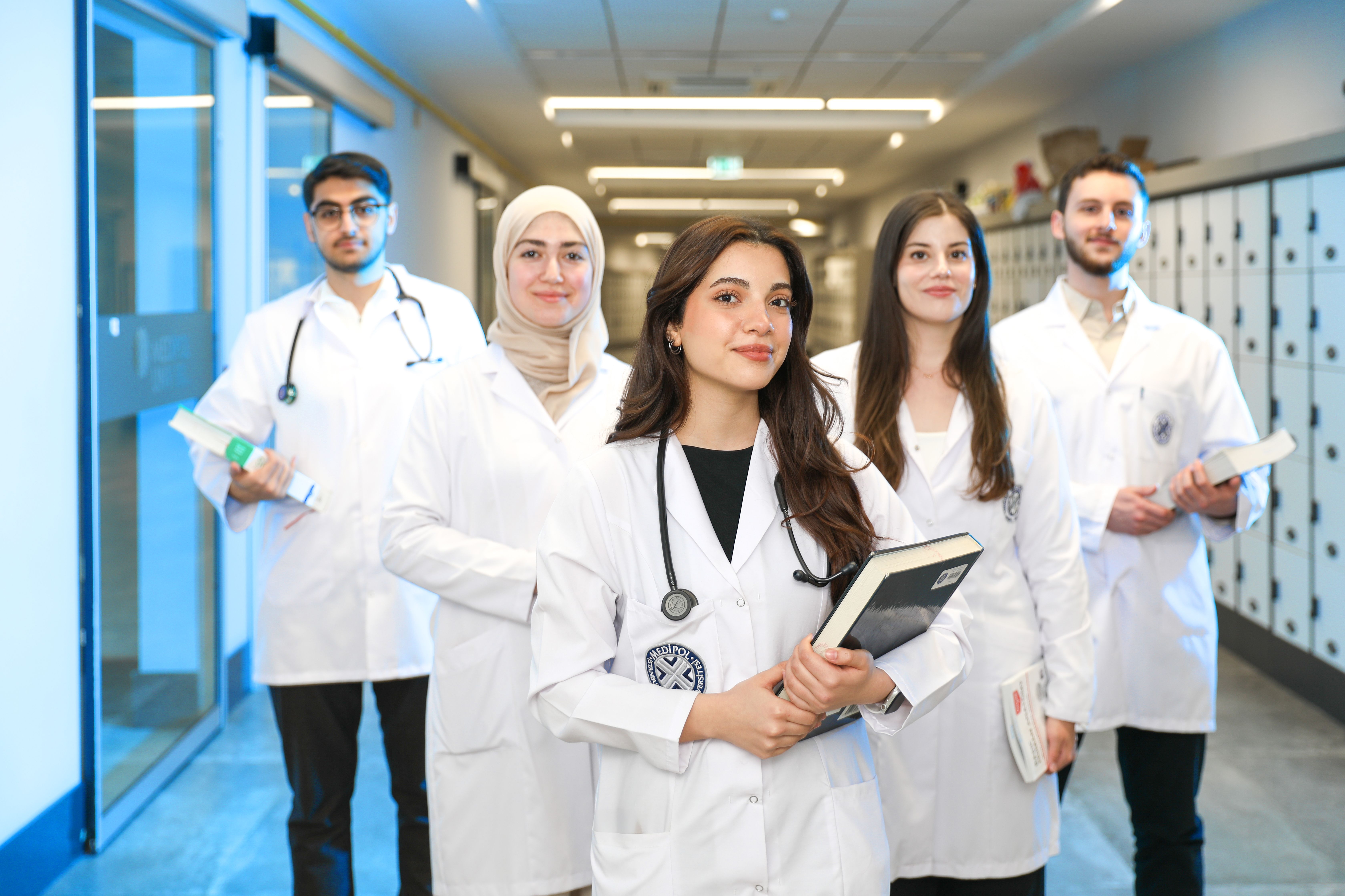 Young Medical Students in University Hallway · Free Stock Photo