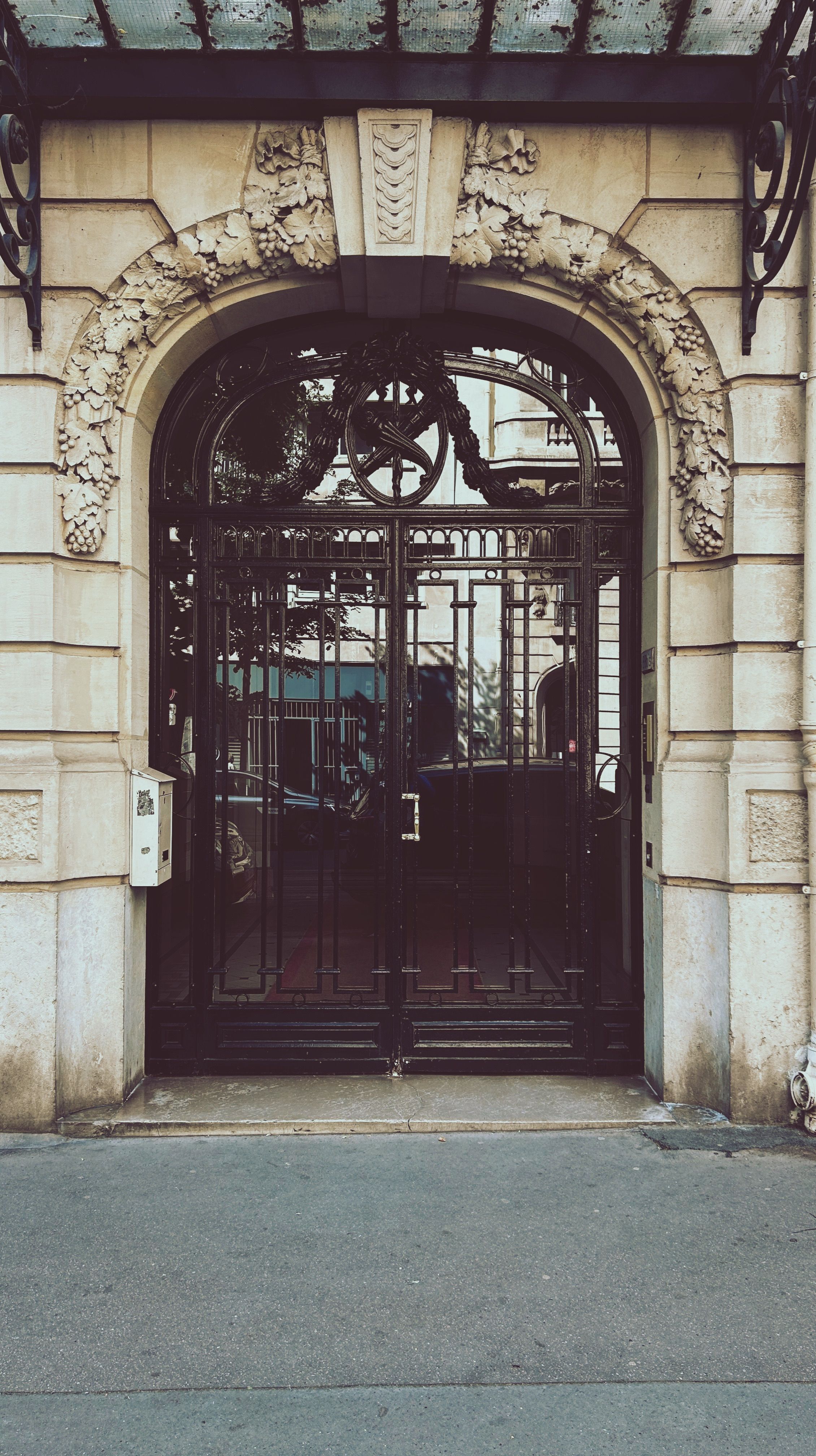 Historic Parisian Architectural Entrance · Free Stock Photo
