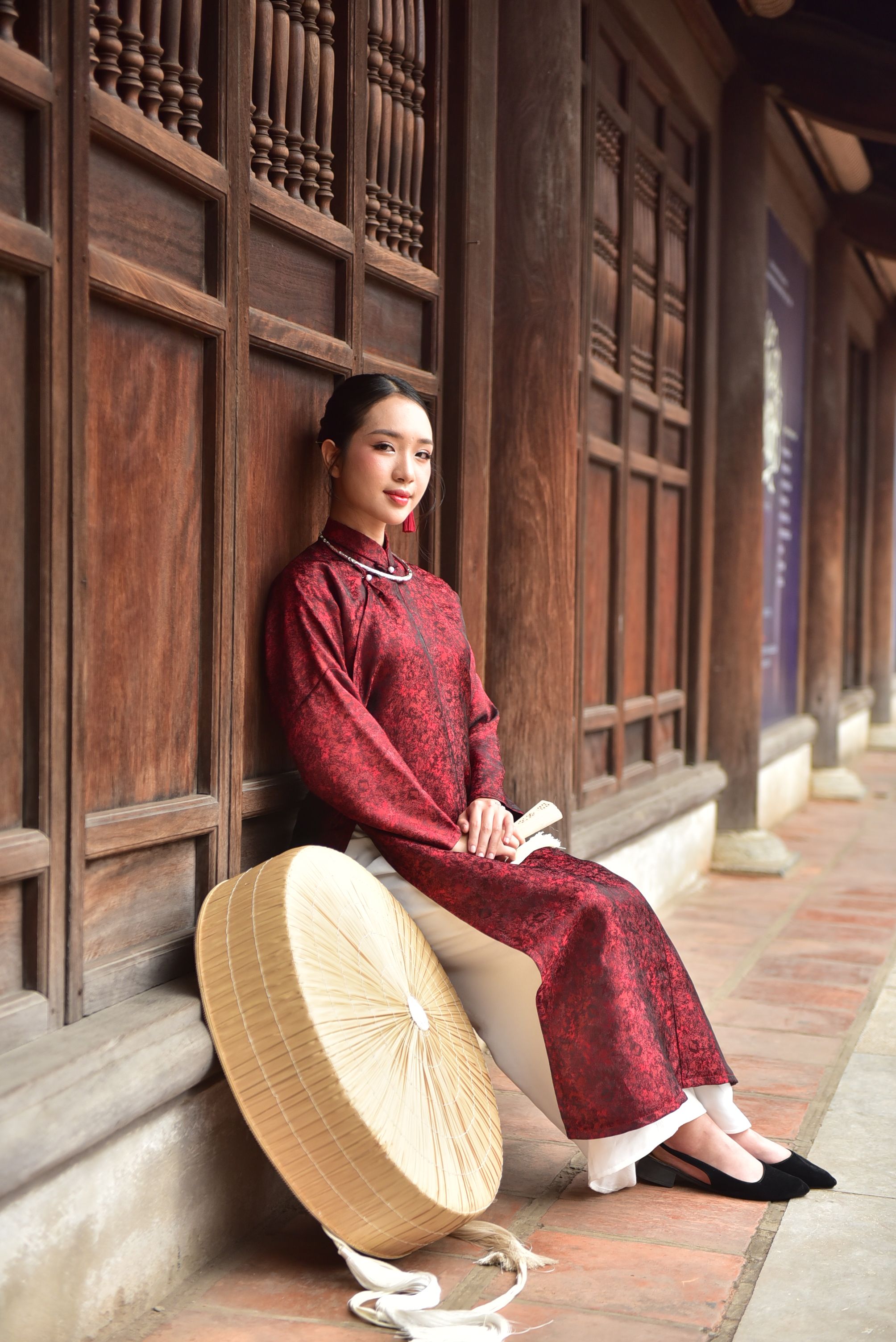 Elegant Woman in Traditional Red Dress with Straw Hat · Free Stock Photo