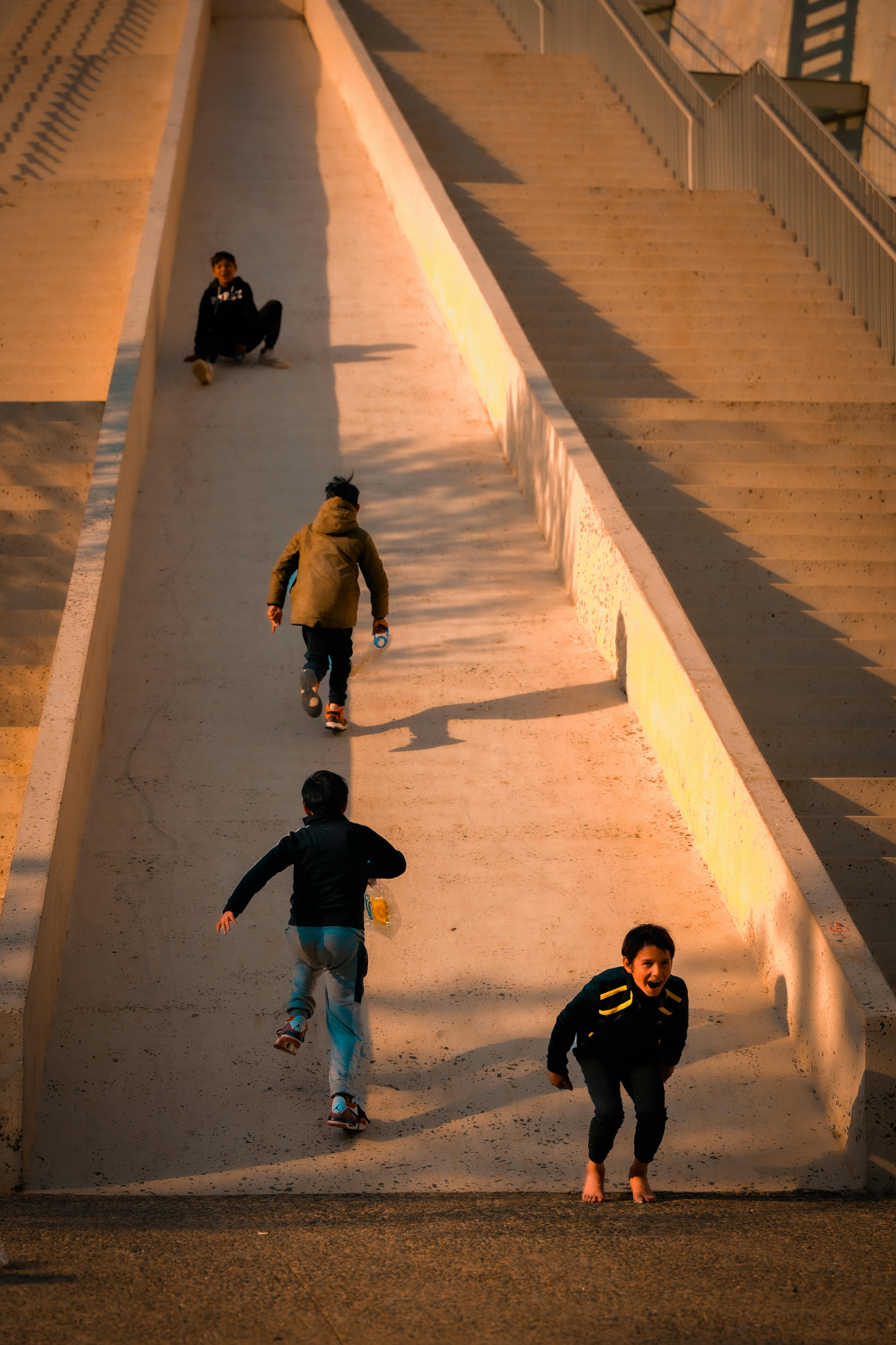 Children Playing on Large Outdoor Slide in Tirana · Free Stock Photo