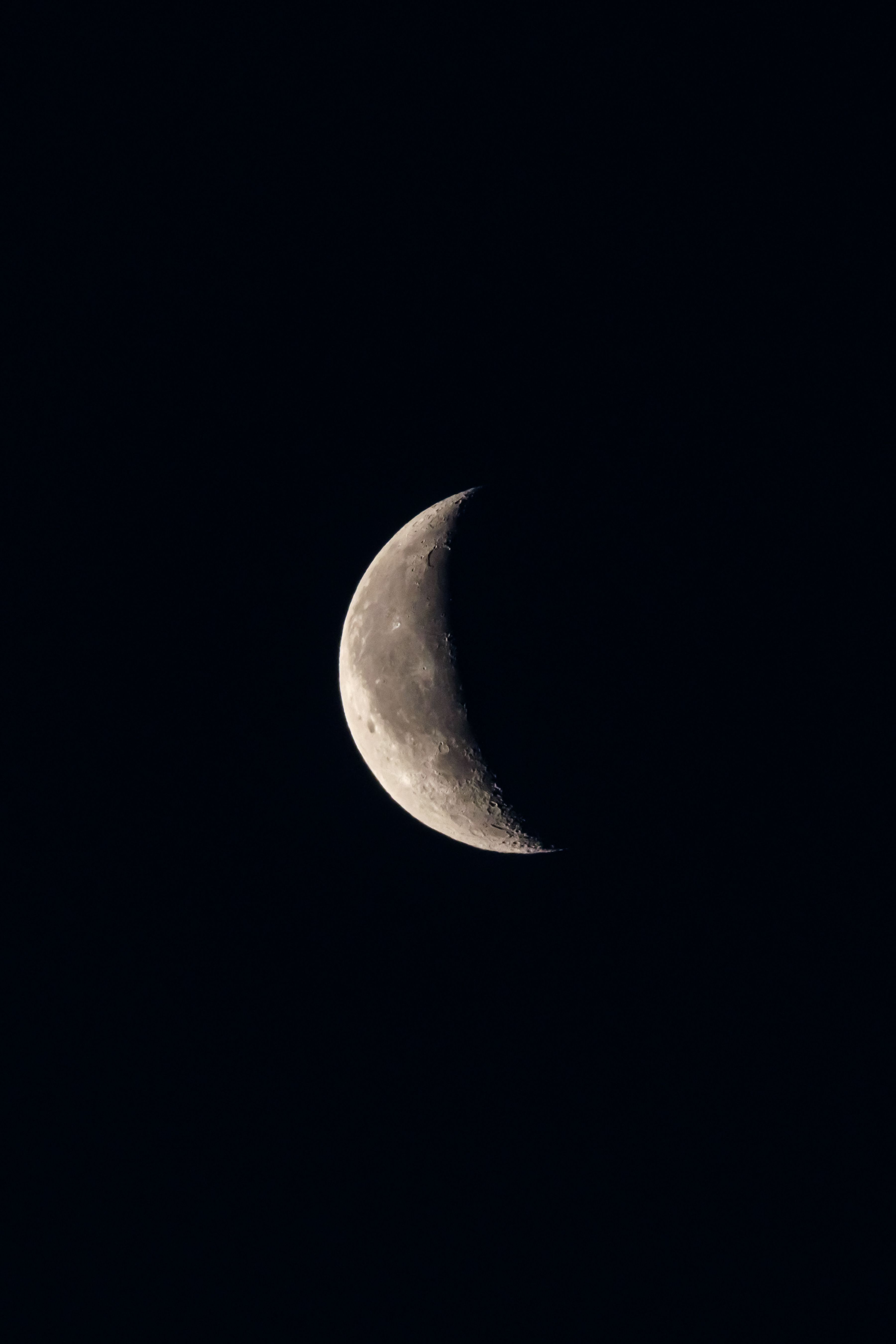 Crescent Moon in a Dark Night Sky · Free Stock Photo