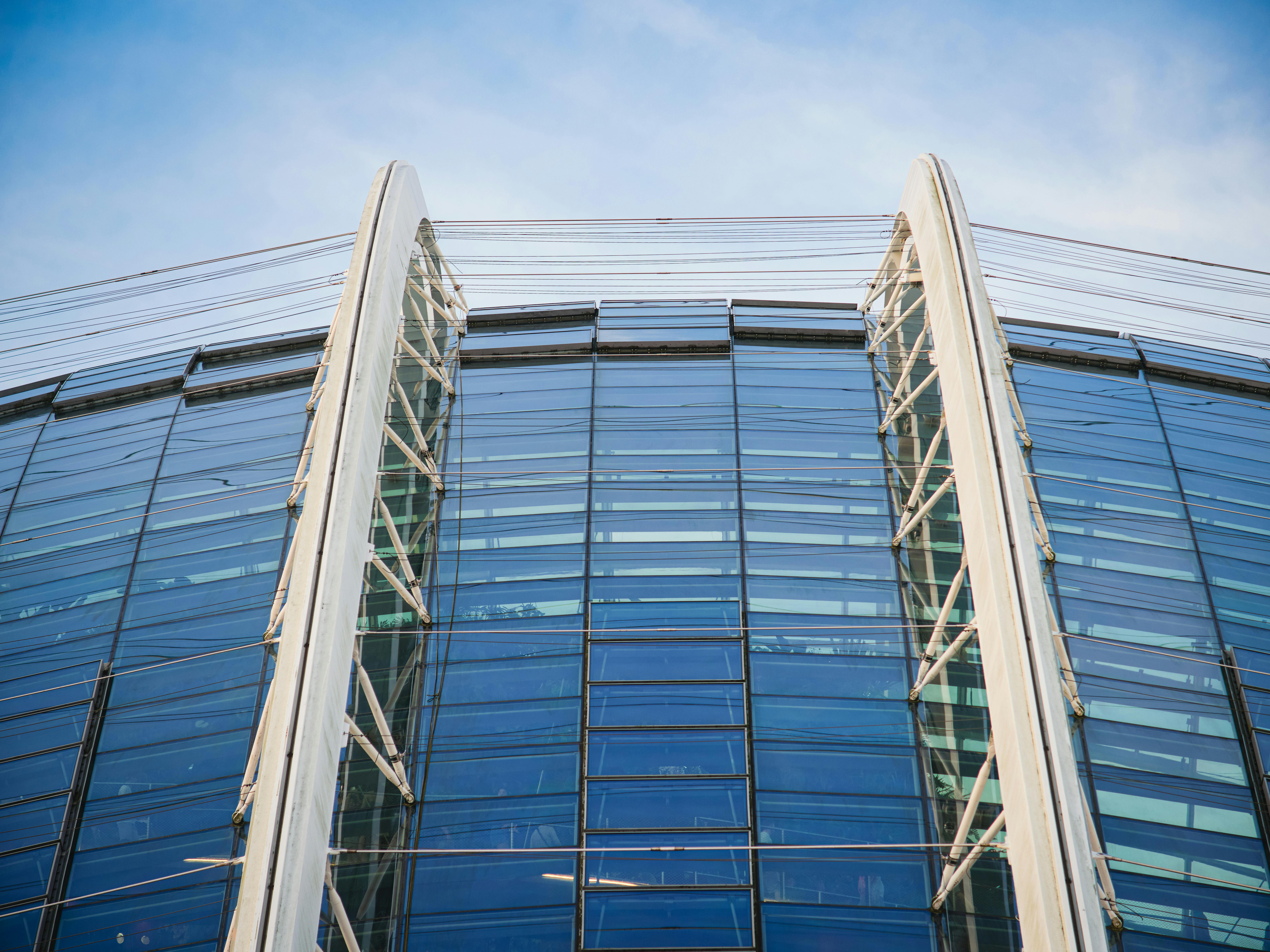 Modern Architectural Glass Building Facade · Free Stock Photo