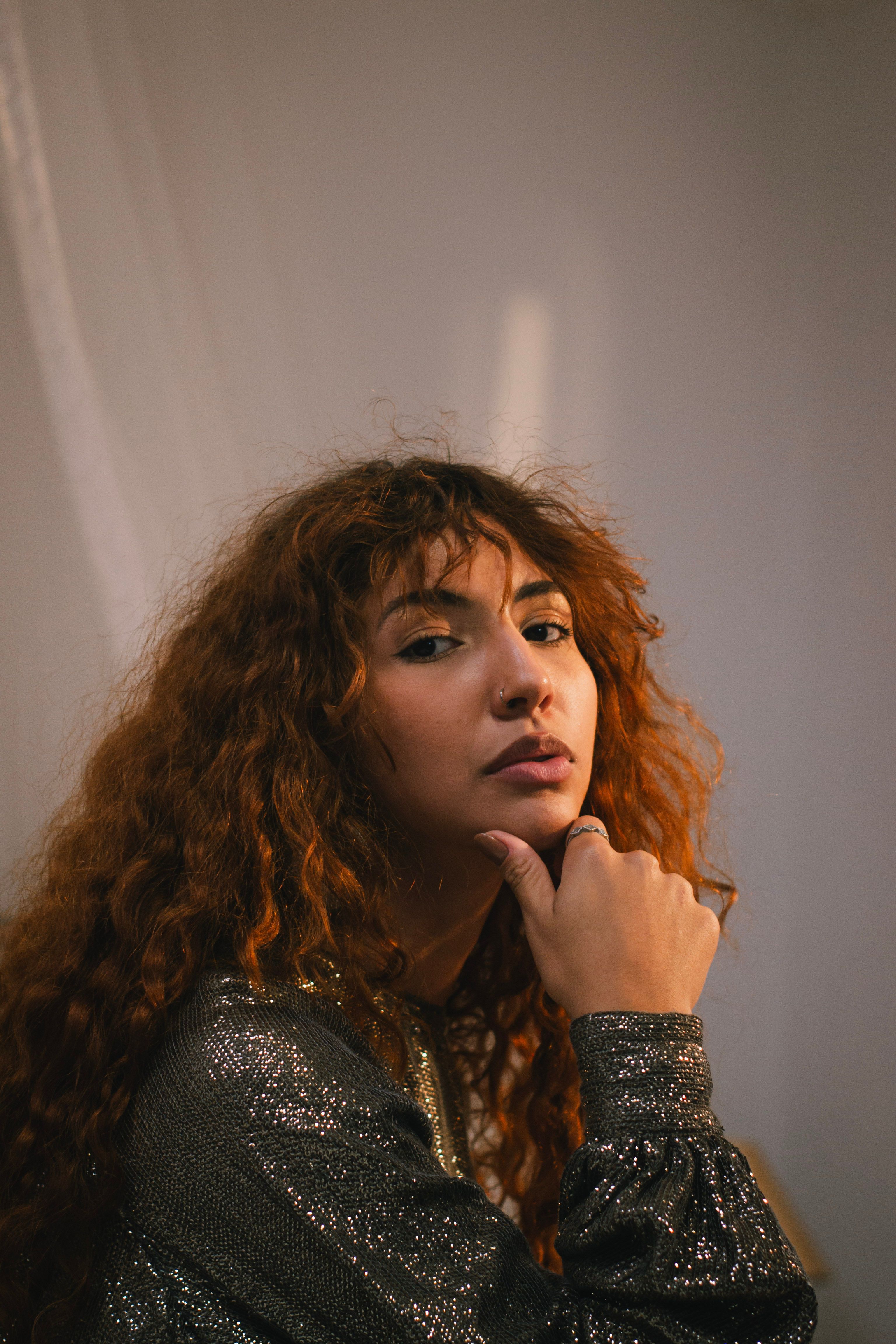 A Curly Hair Woman Smoking Weed · Free Stock Photo