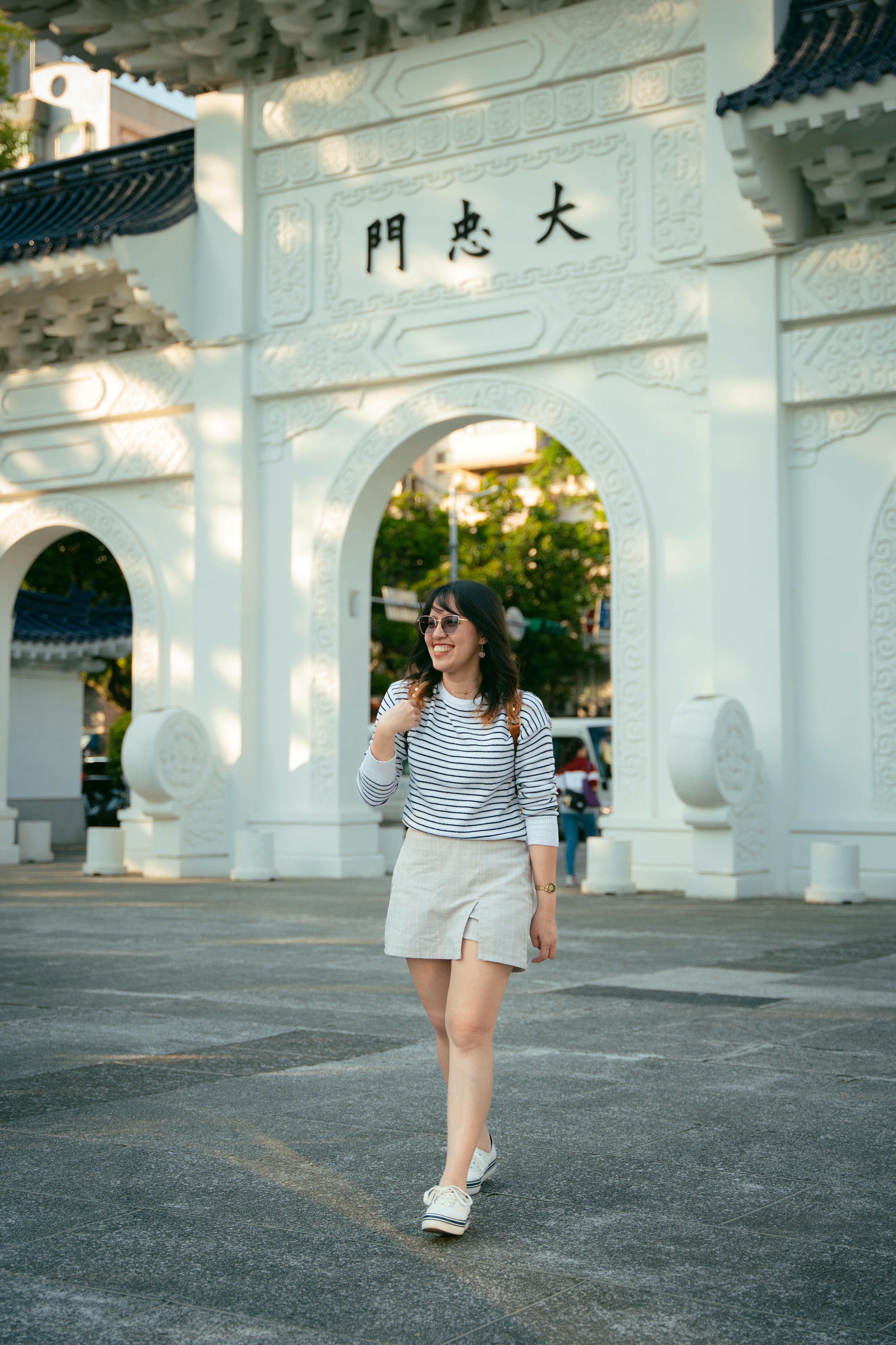 Woman Strolling at Taipei's National Chiang Kai-shek Memorial · Free ...