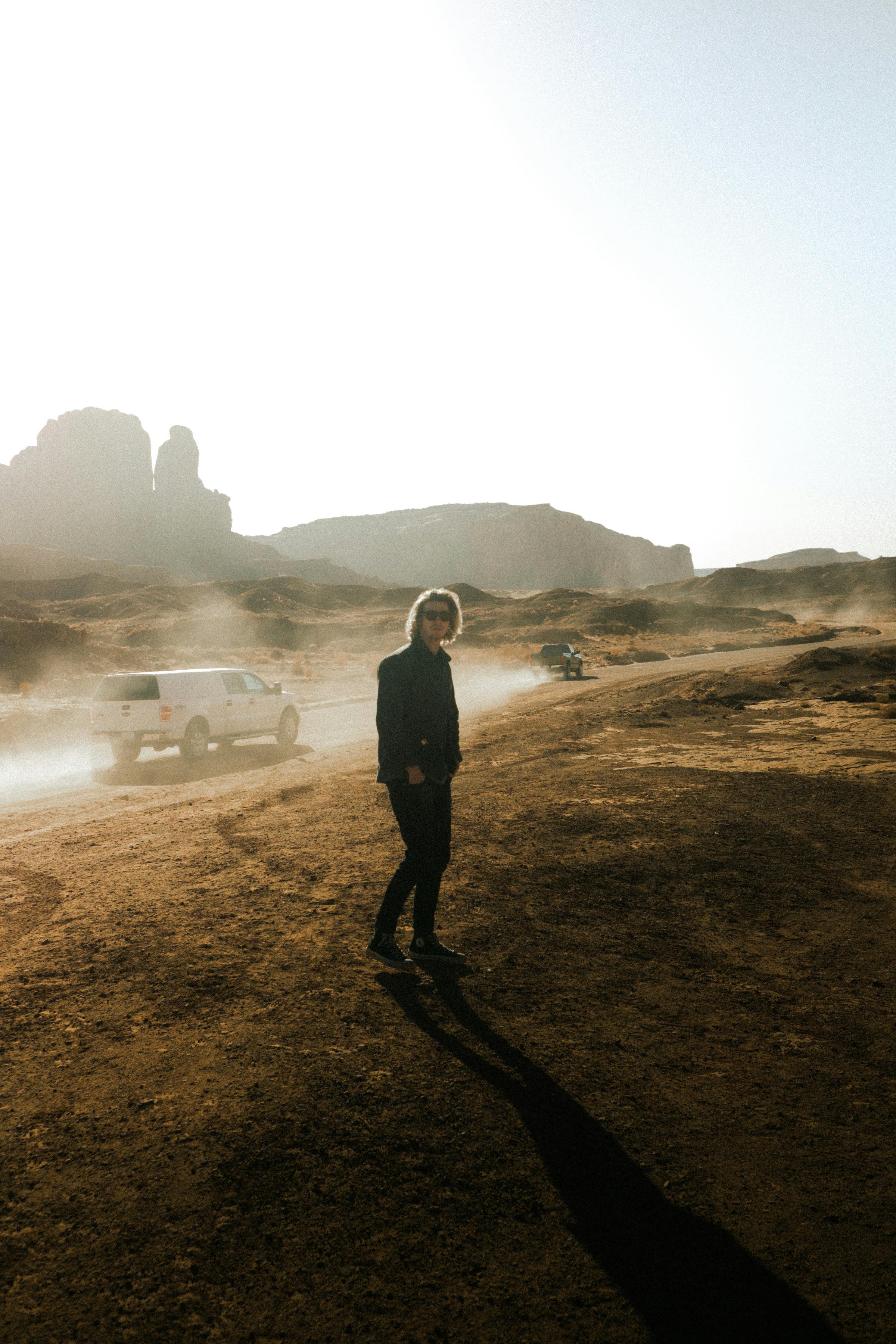 Man Standing Beside Tree · Free Stock Photo