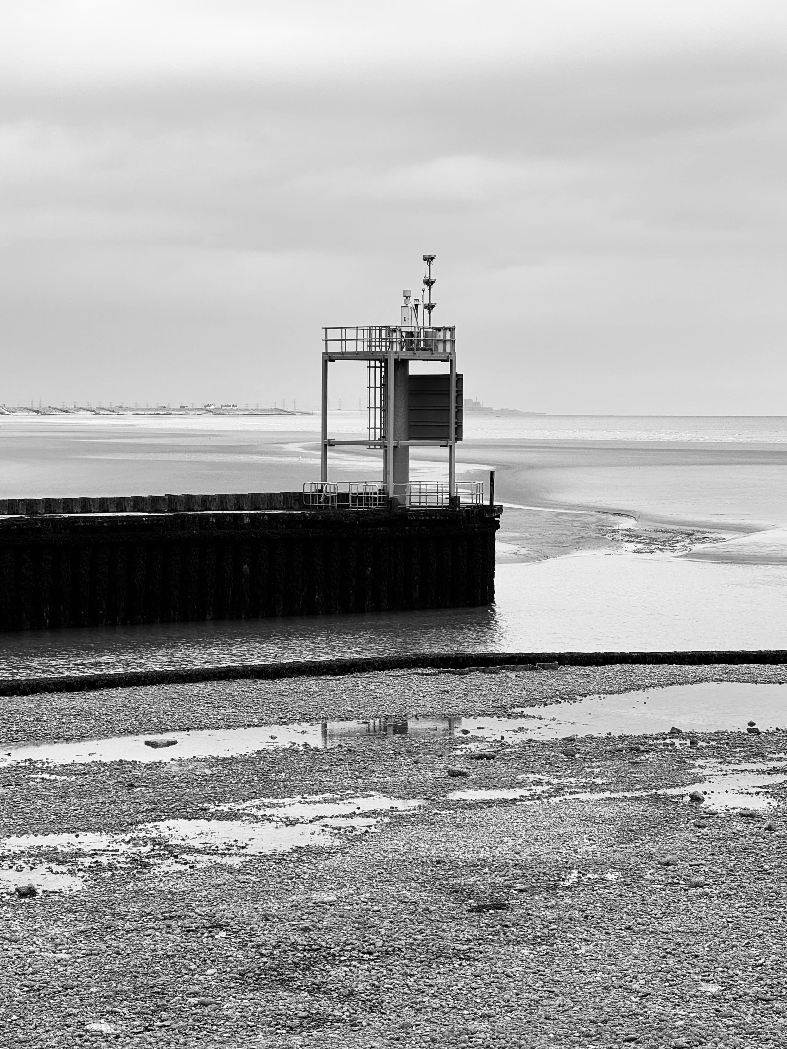 Black and White Seascape with Coastal Structure · Free Stock Photo