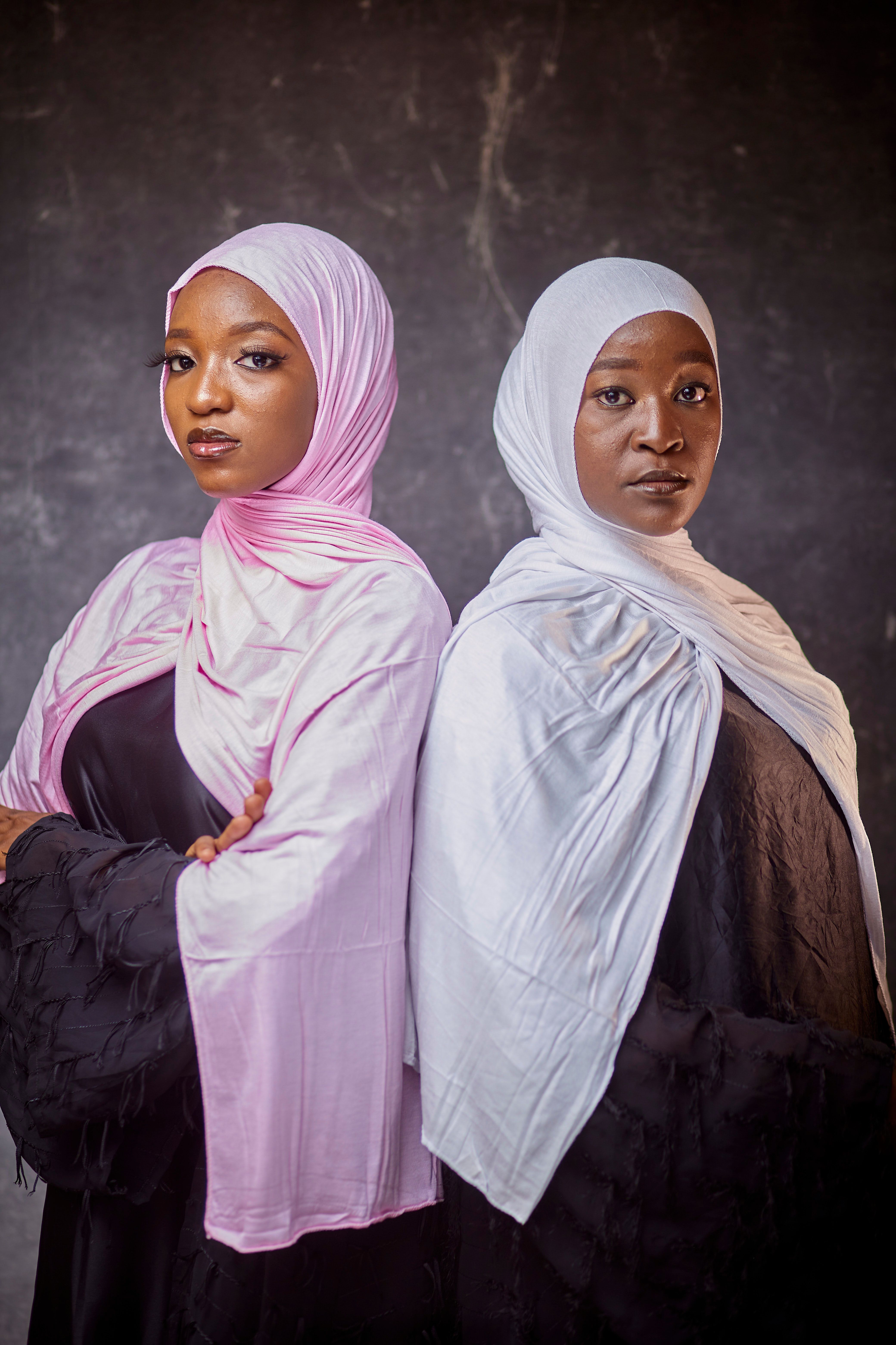 Portrait of Two Women in Hijabs in a Studio Setting · Free Stock Photo