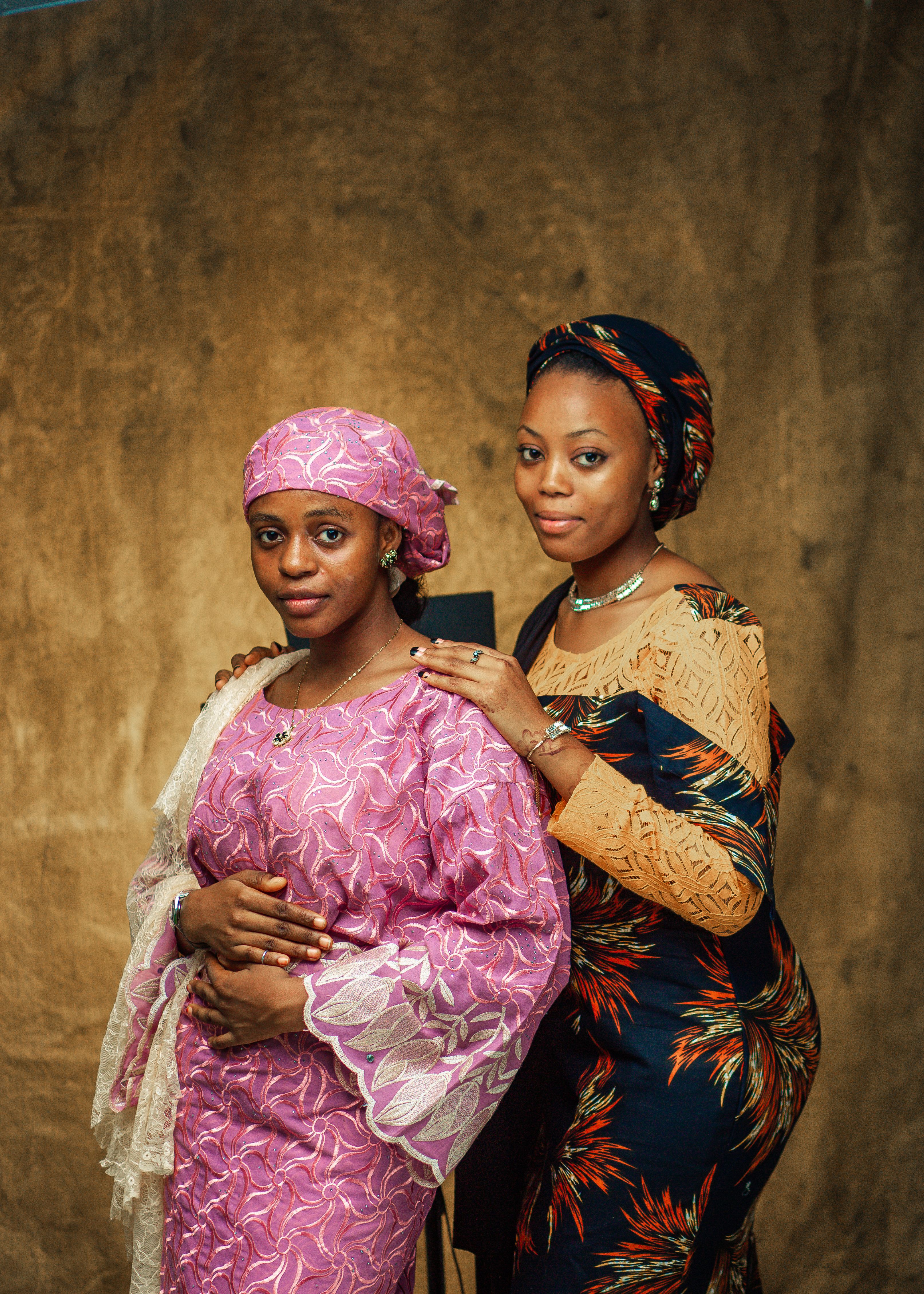 Elegant Portrait of Two Women in Traditional Attire · Free Stock Photo