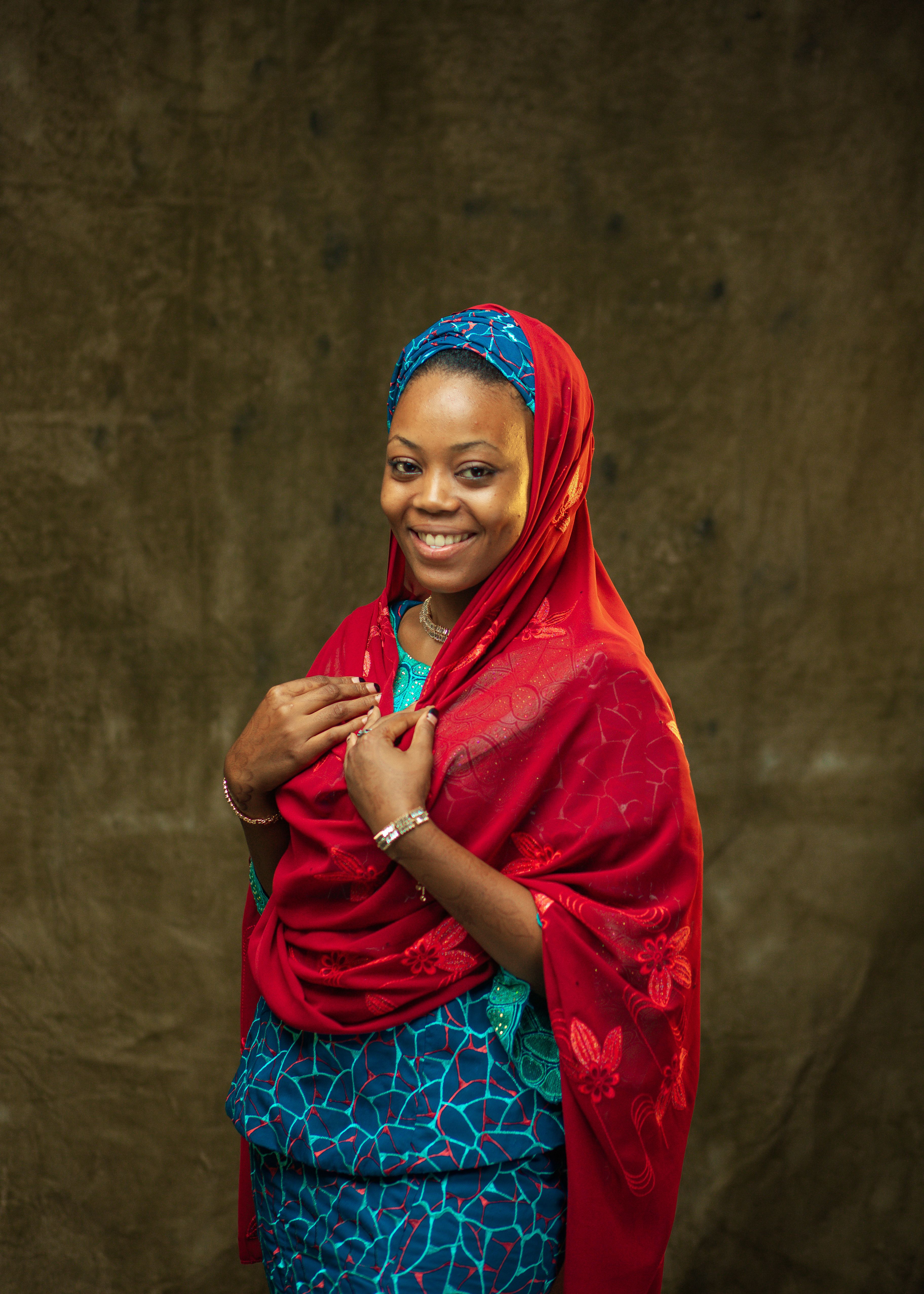 Portrait of African Woman in Vibrant Traditional Attire · Free Stock Photo