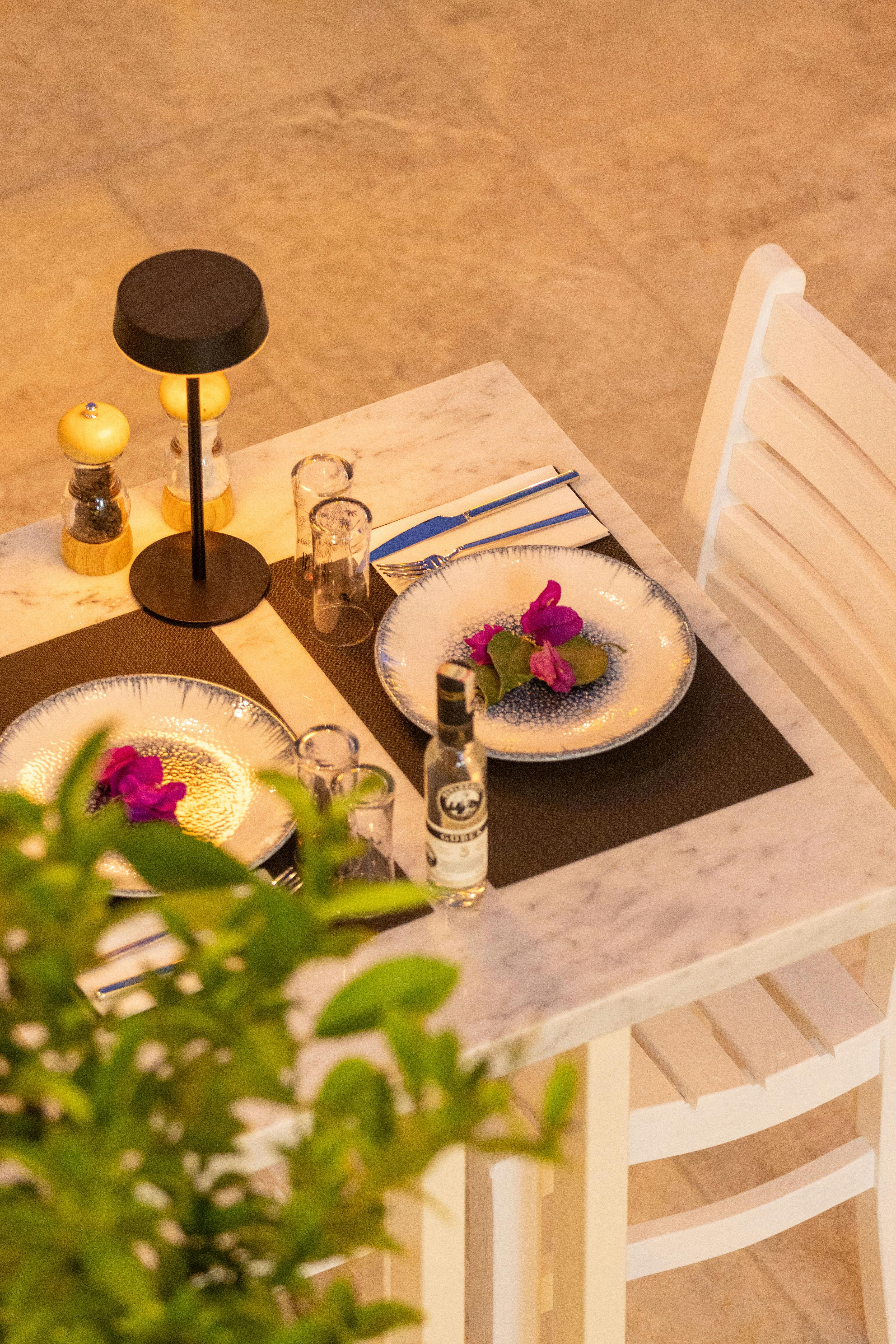 Romantic Dinner Setup with Elegant Table Decor · Free Stock Photo