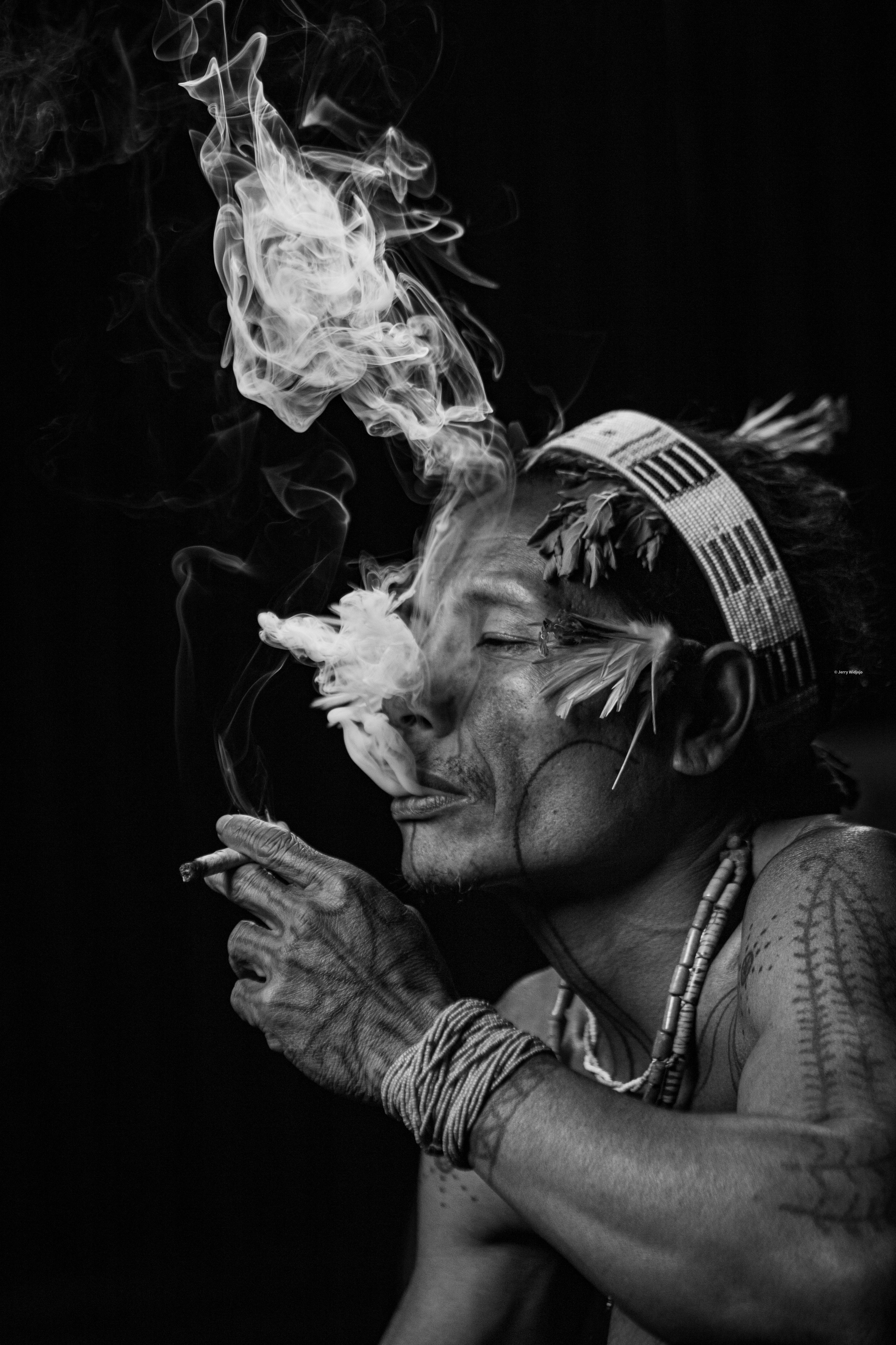 Traditional West Sumatran Smoking Ritual Portrait · Free Stock Photo