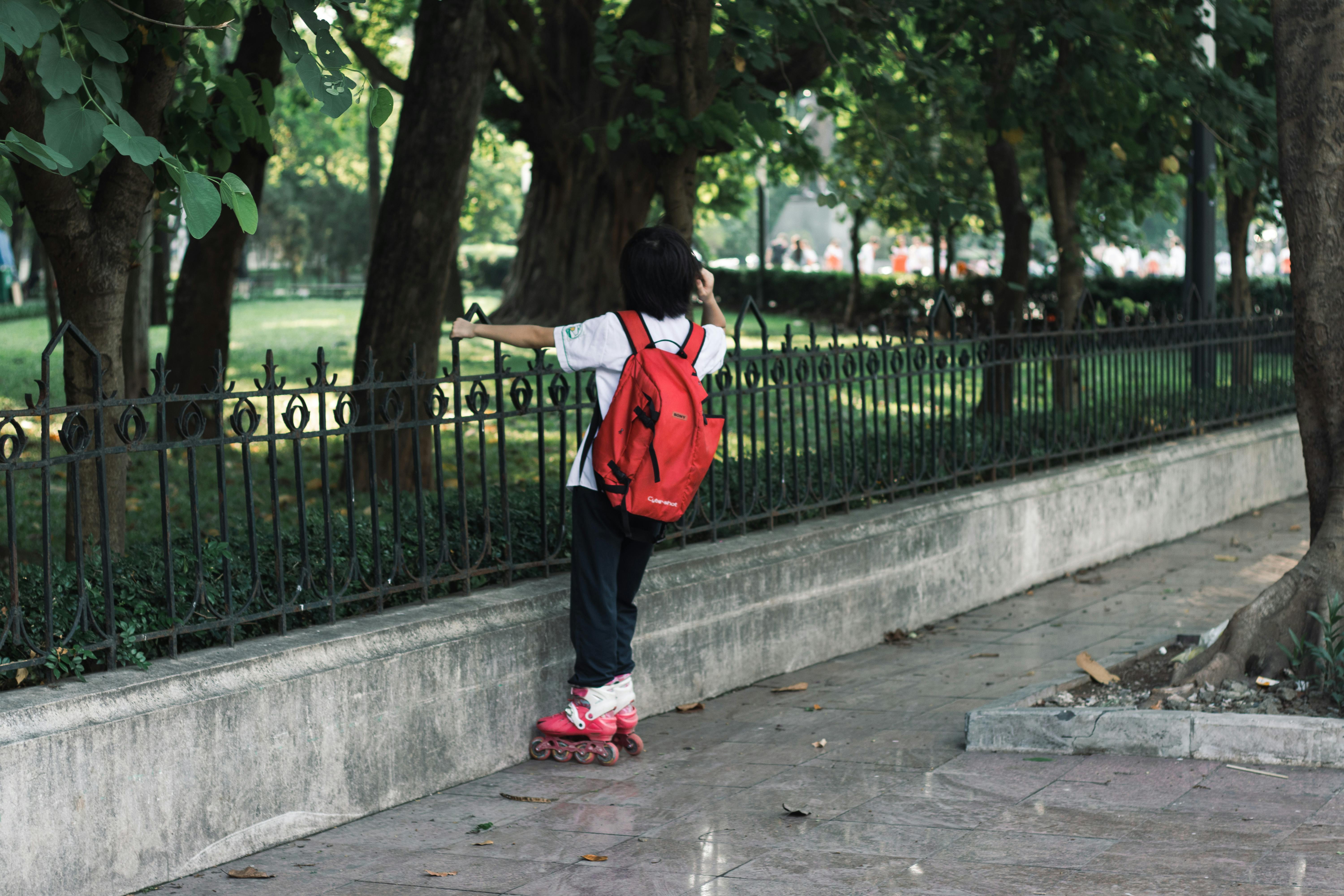 Child Rollerblading in Hanoi Park Setting · Free Stock Photo