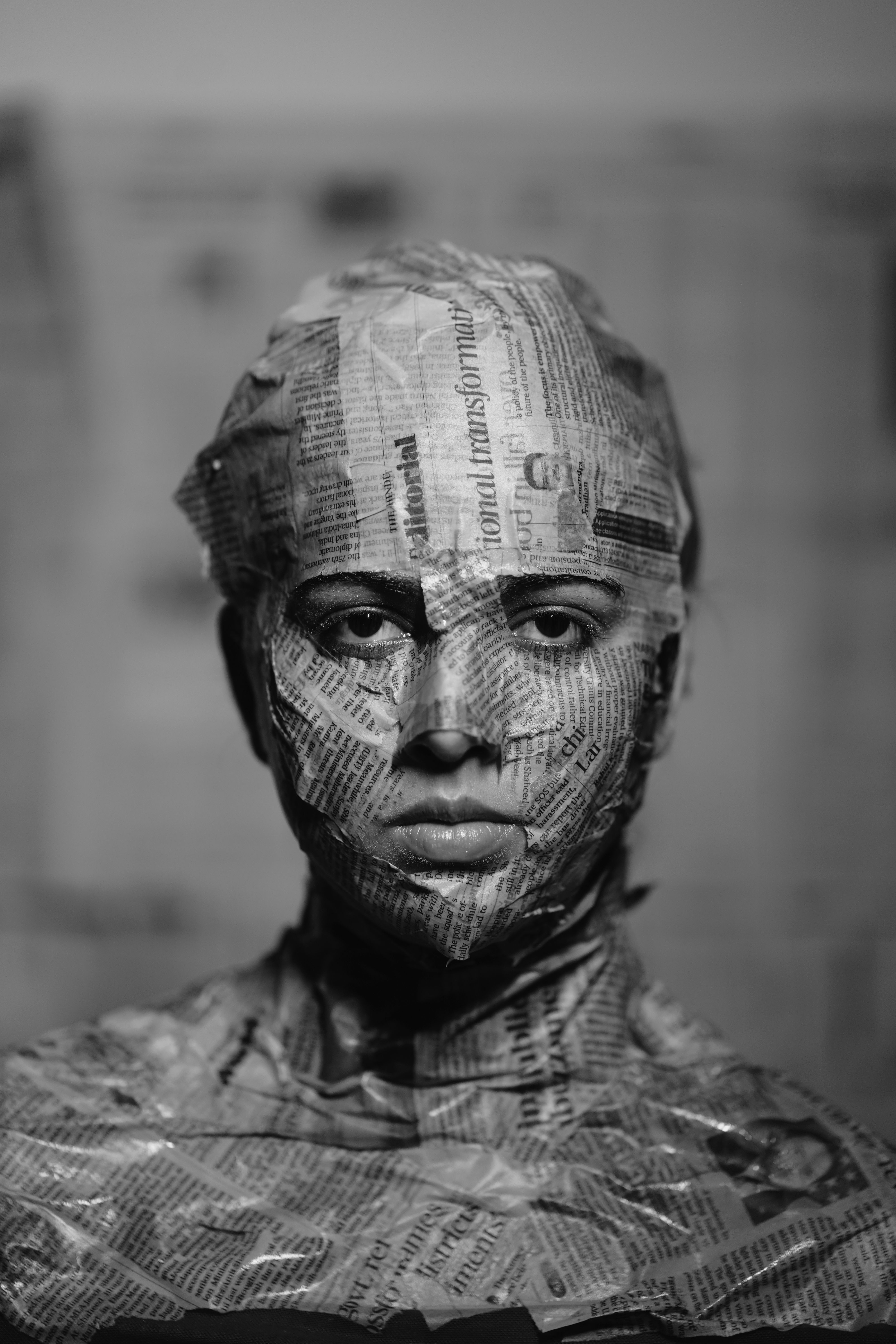 Creative Black and White Newspaper Photoshoot Portrait · Free Stock Photo
