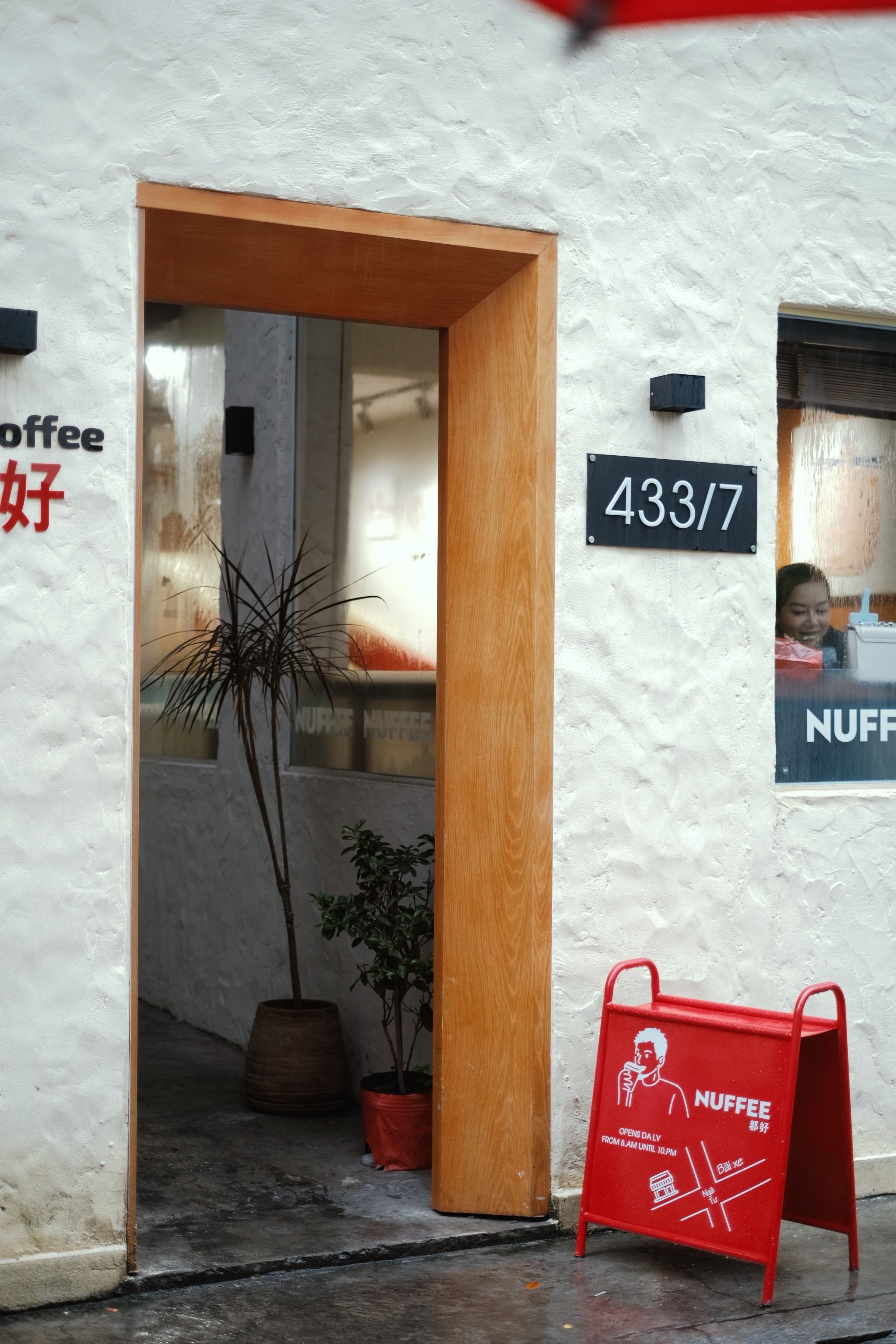 Trendy Coffee Shop Entrance with Red Signage · Free Stock Photo