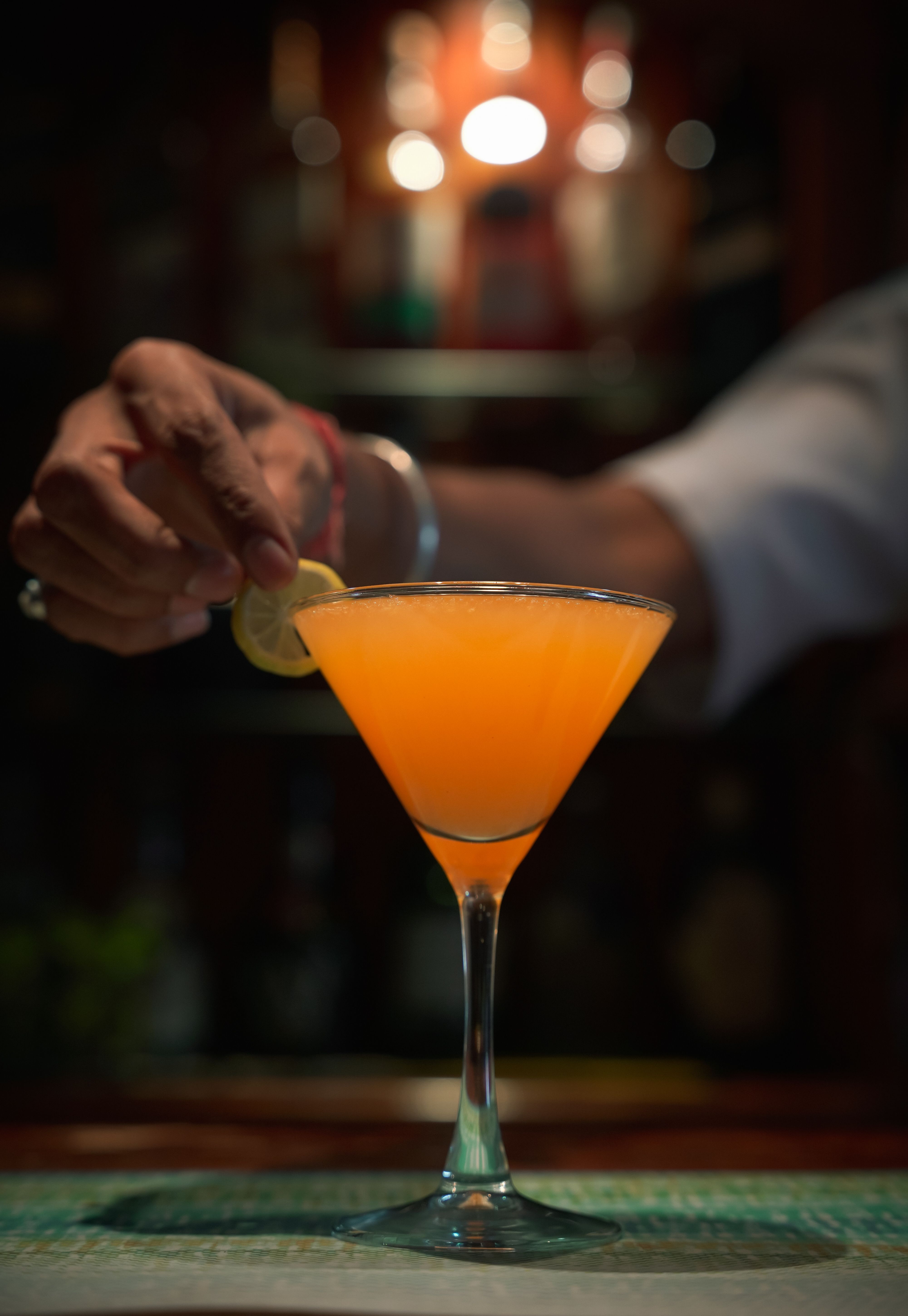 Refreshing Citrus Cocktail with Orange Glow · Free Stock Photo