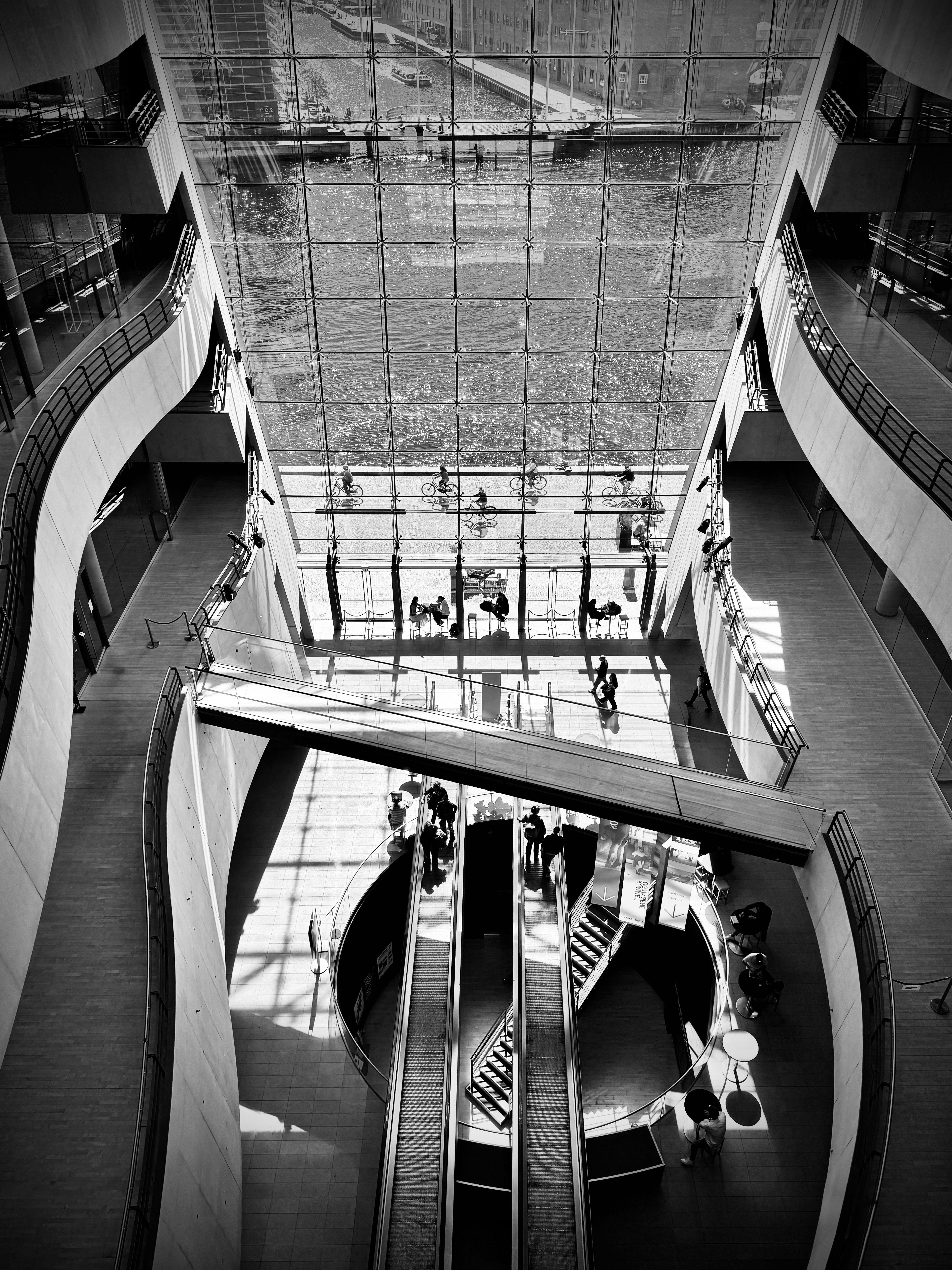 Modern Atrium with Escalators in Black and White · Free Stock Photo