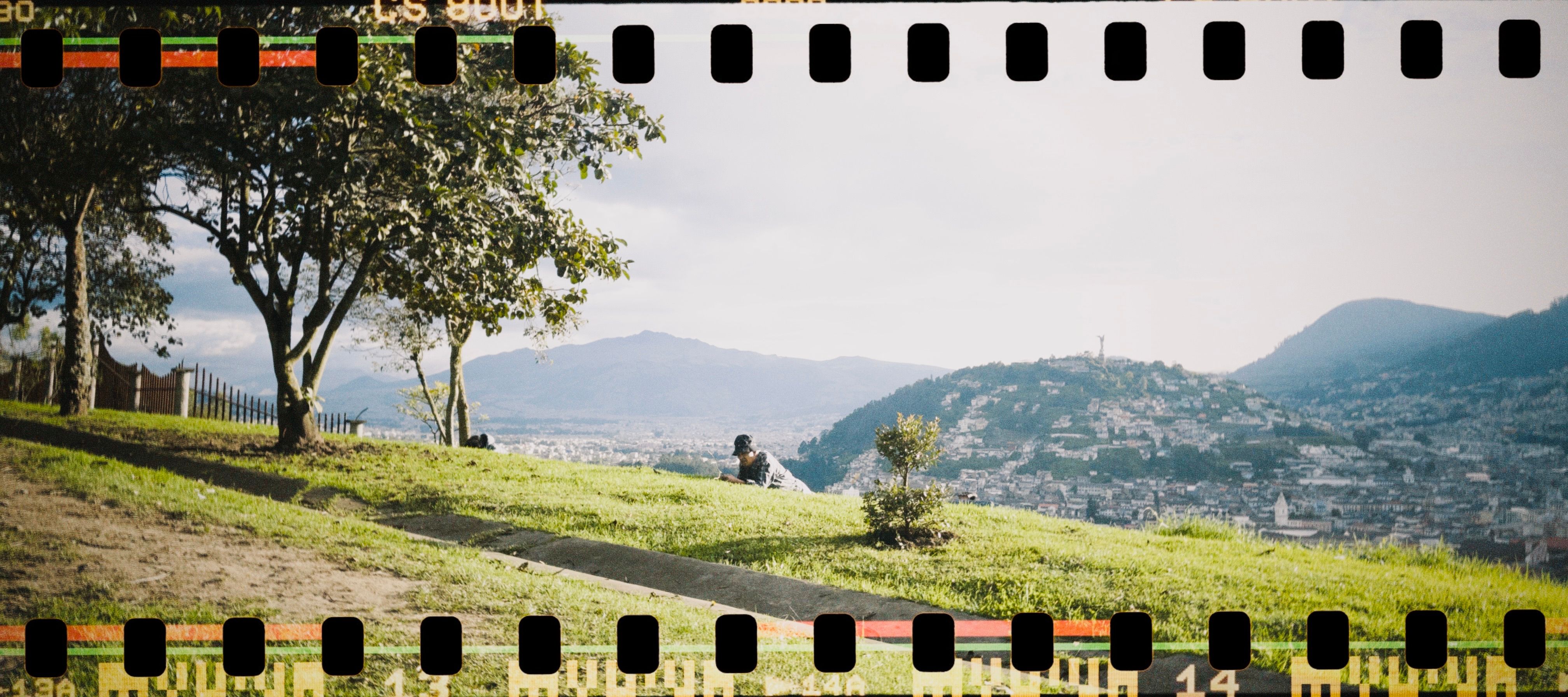 Relaxing in Nature Overlooking Quito's Skyline · Free Stock Photo