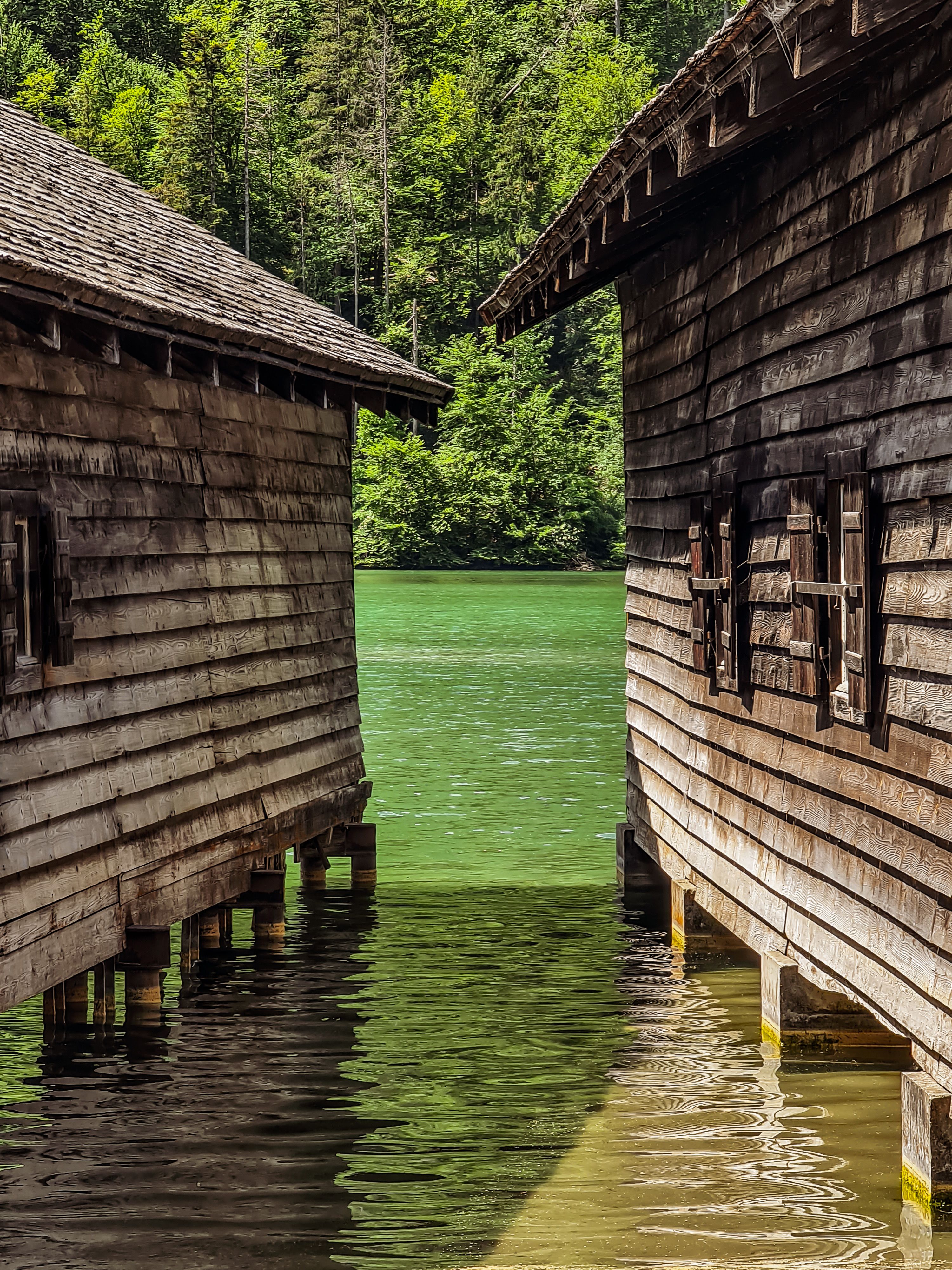 Historic Wooden Boathouses Overlooking Lake · Free Stock Photo